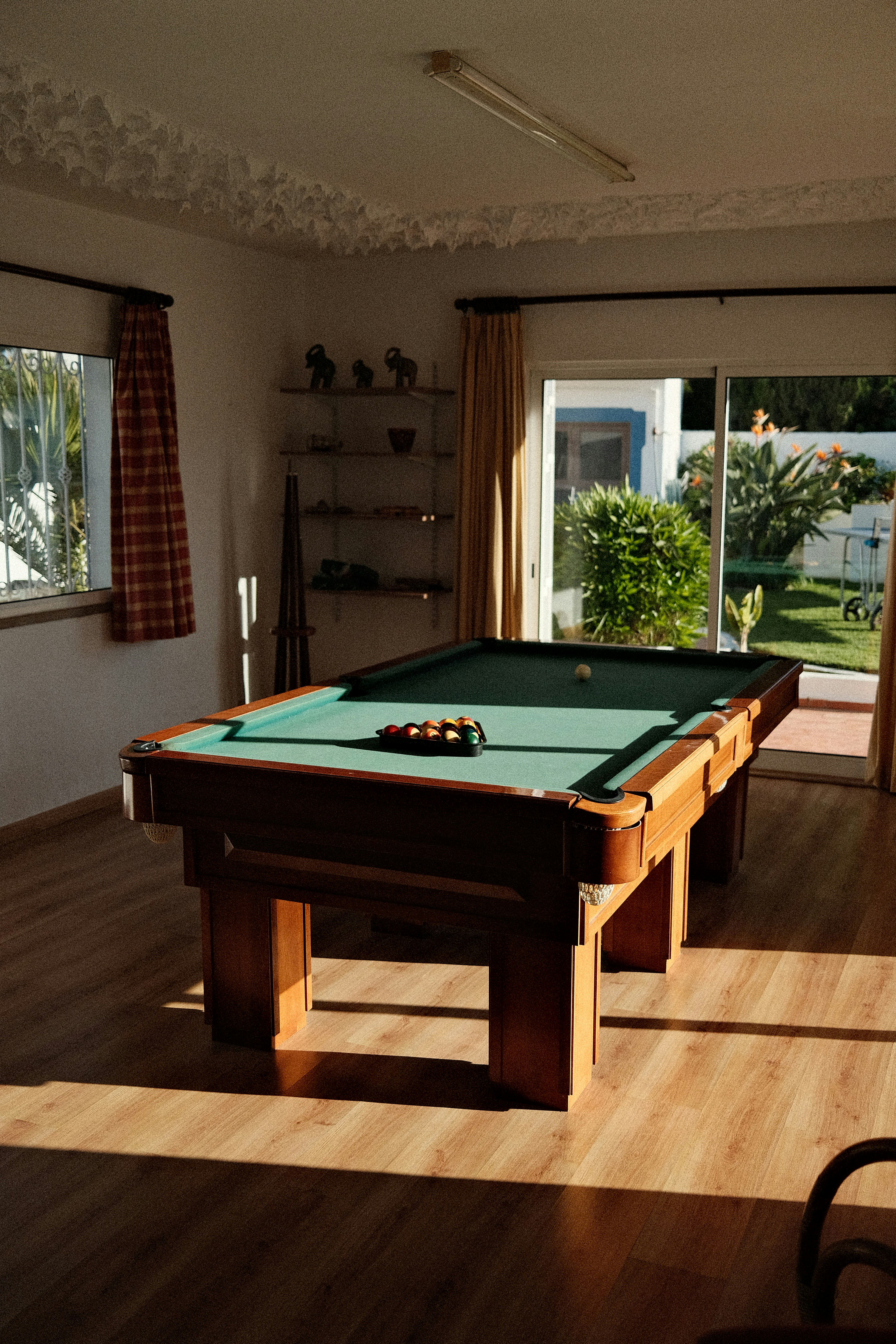 Sunlit Billiards Room: Craftsmanship, Light, and Quiet Focus