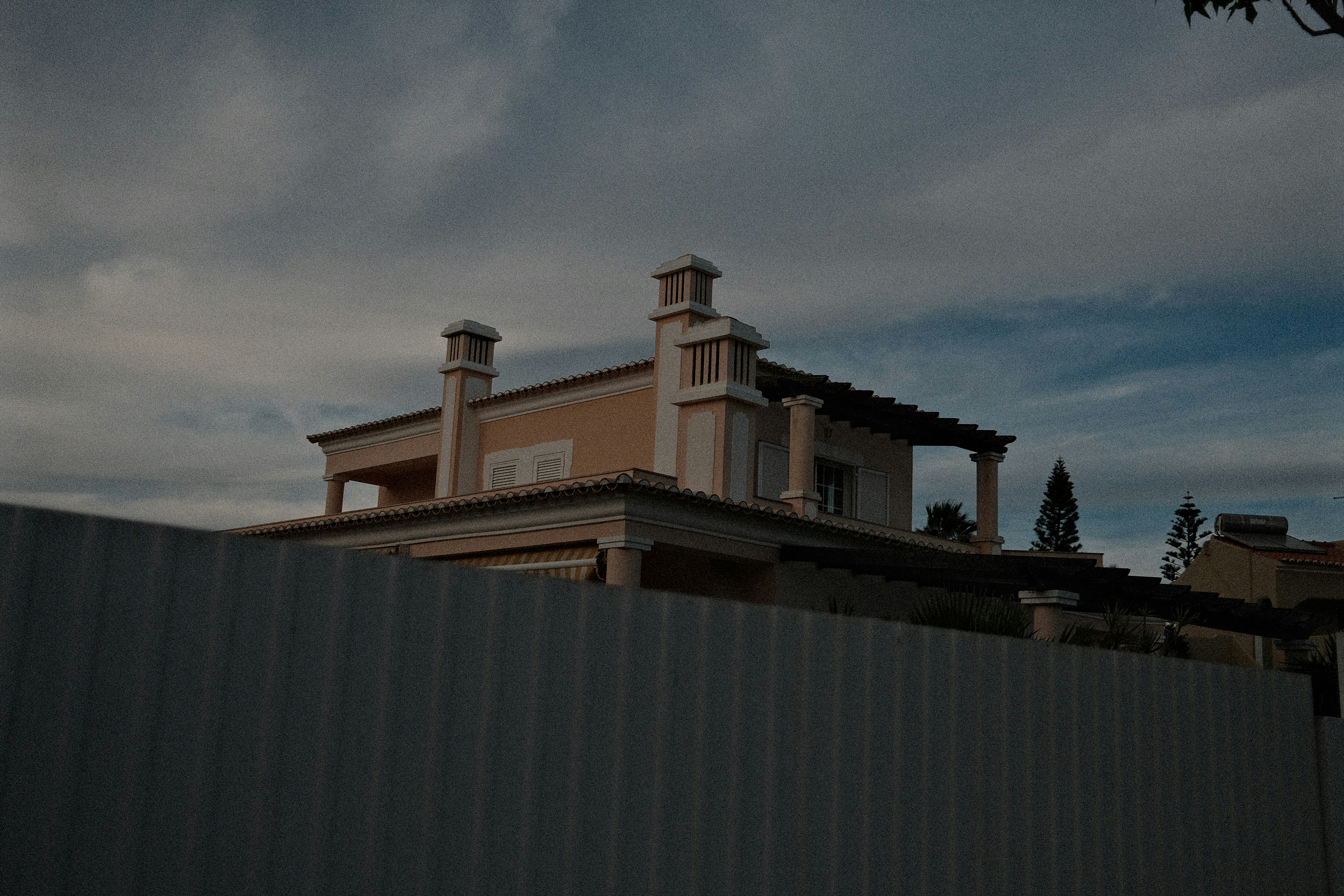 Terraced Villa Under a Stormy Sky
