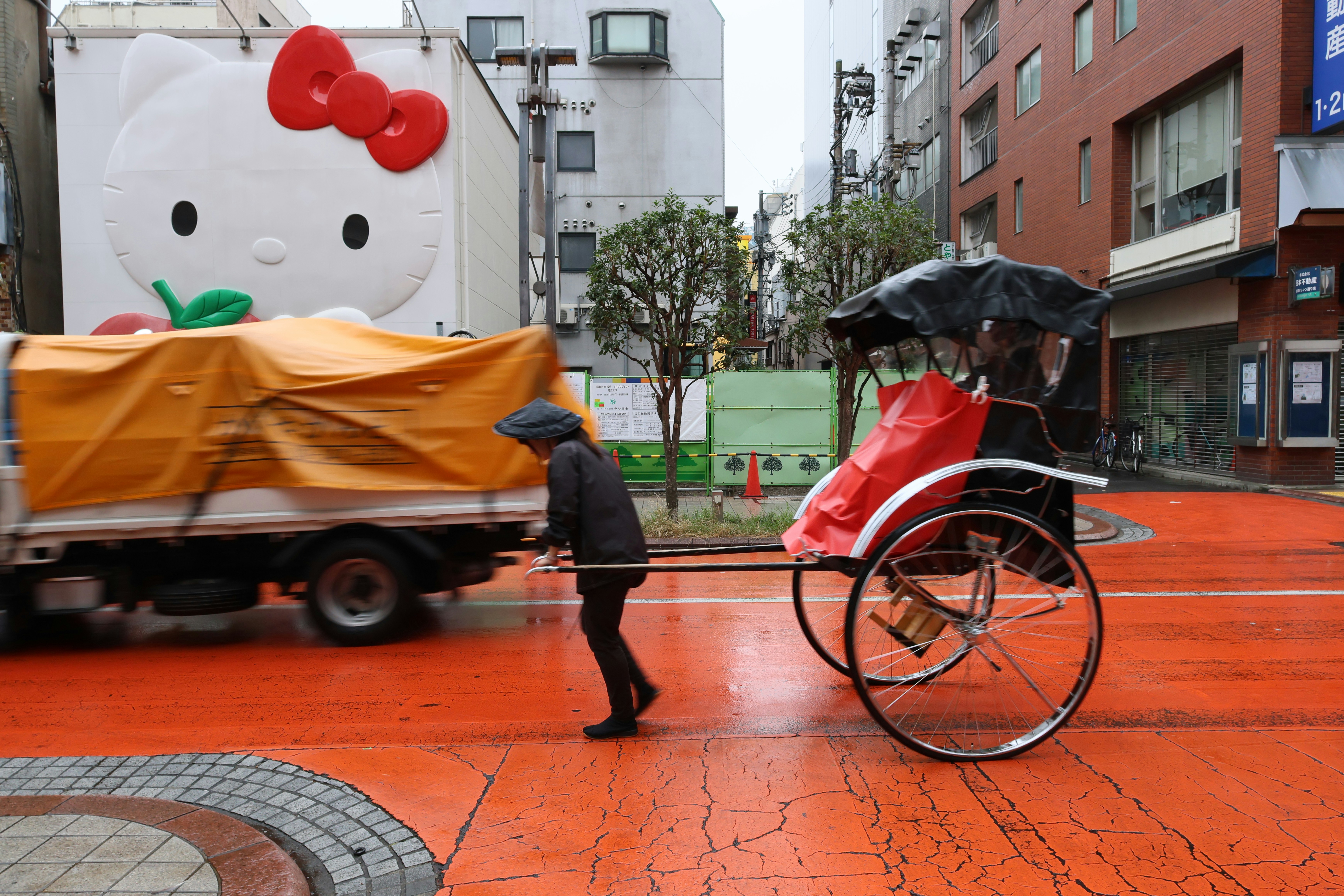 Hello Kitty on the Rainy Red Street: A Streetcar Moment