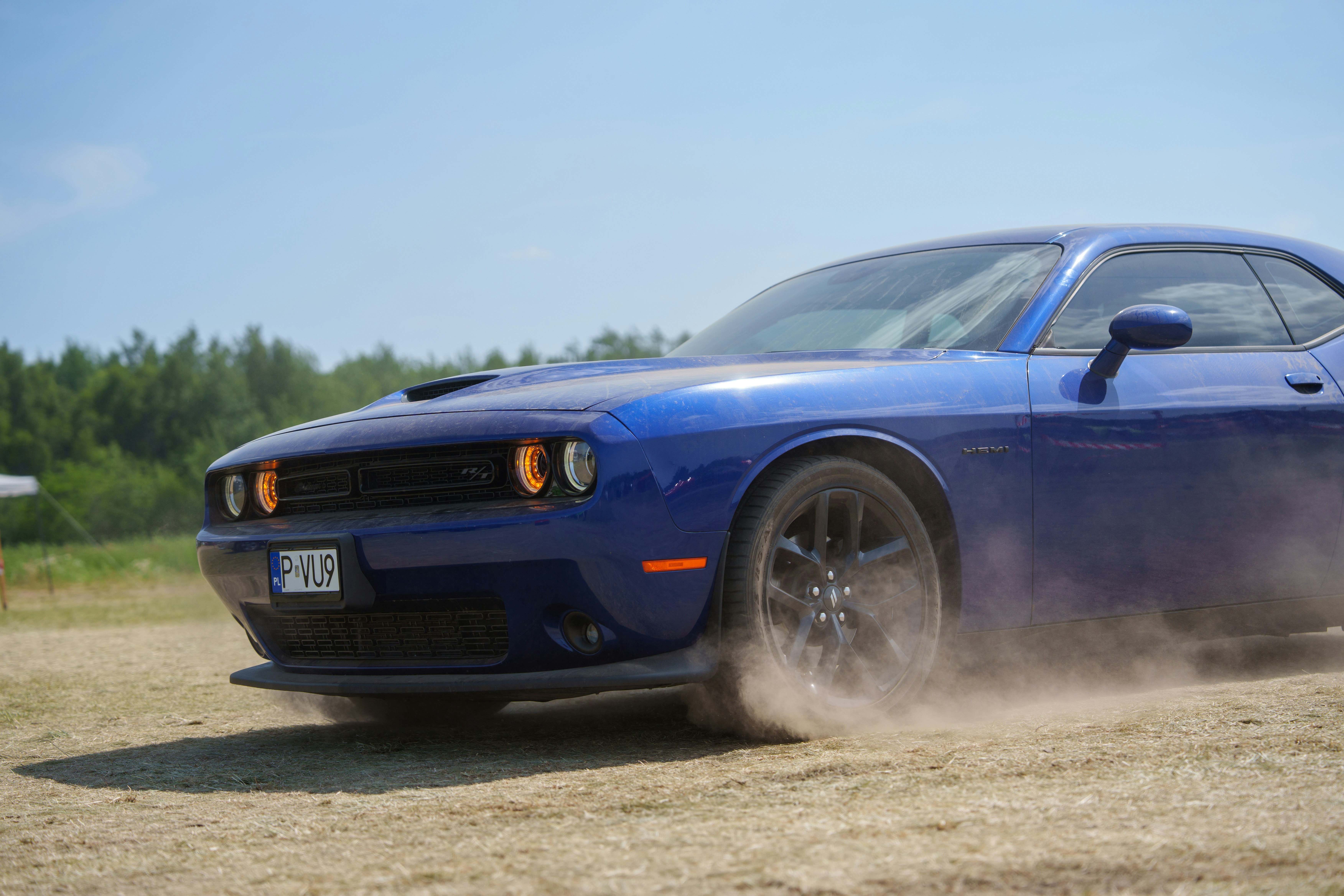 Blue Challenger in Dusty Run: A Low-Slung Power Moment