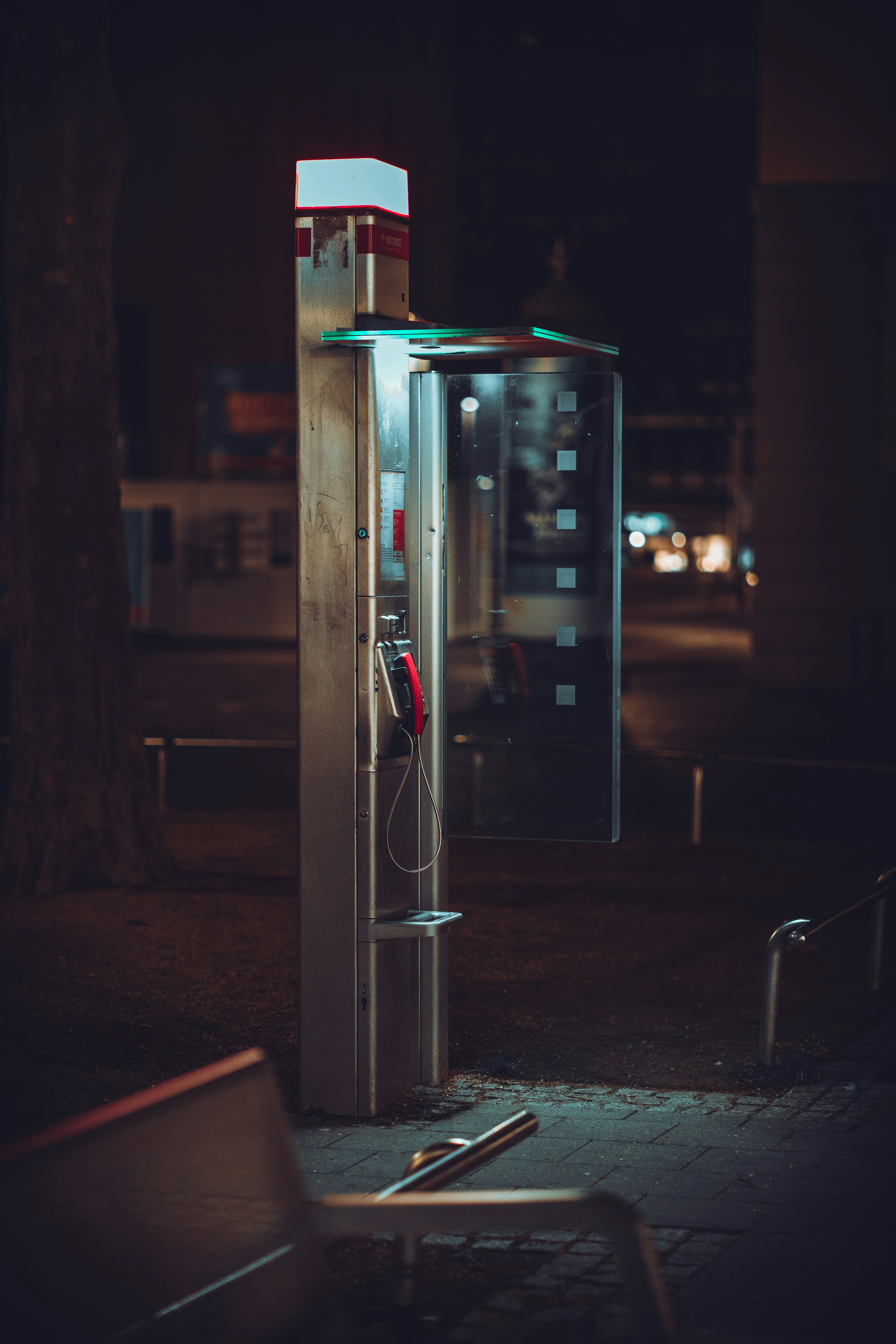 Neon-lit Payphone at Dusk