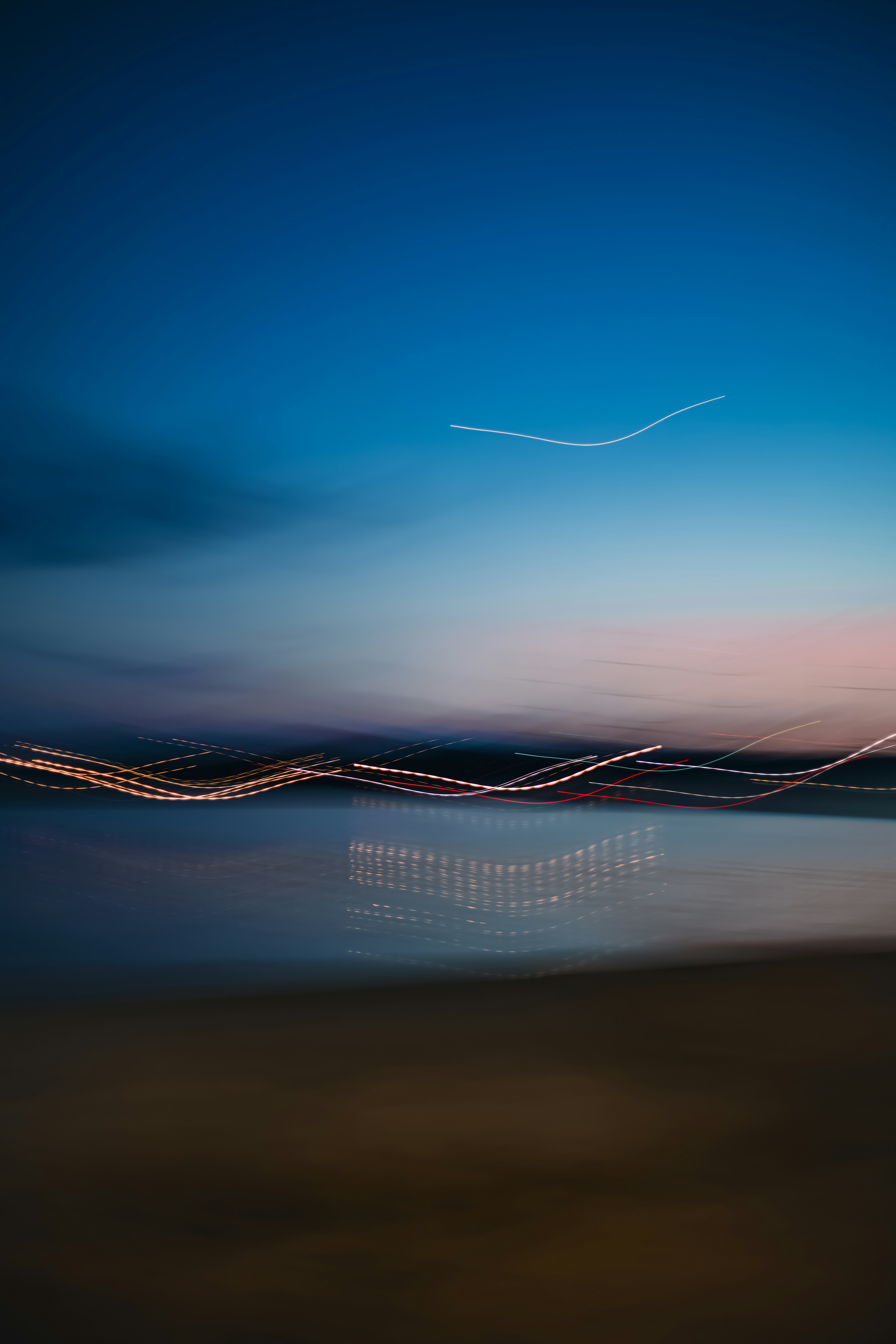 Midnight Skyline Sketch: Light Trails Across a Quiet Horizon