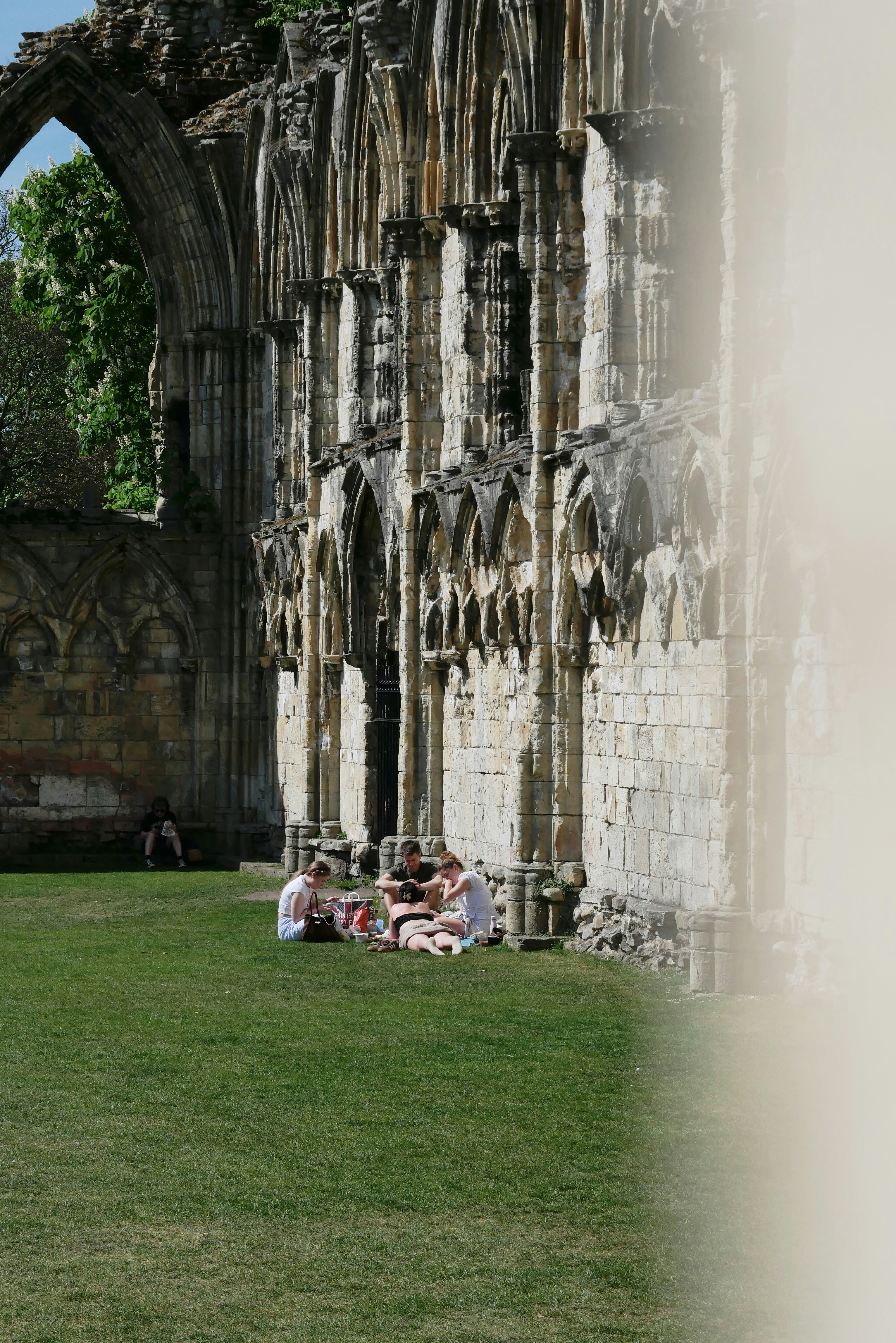 Students Picnic at the Ruins: A Quiet Corner in the Abbey