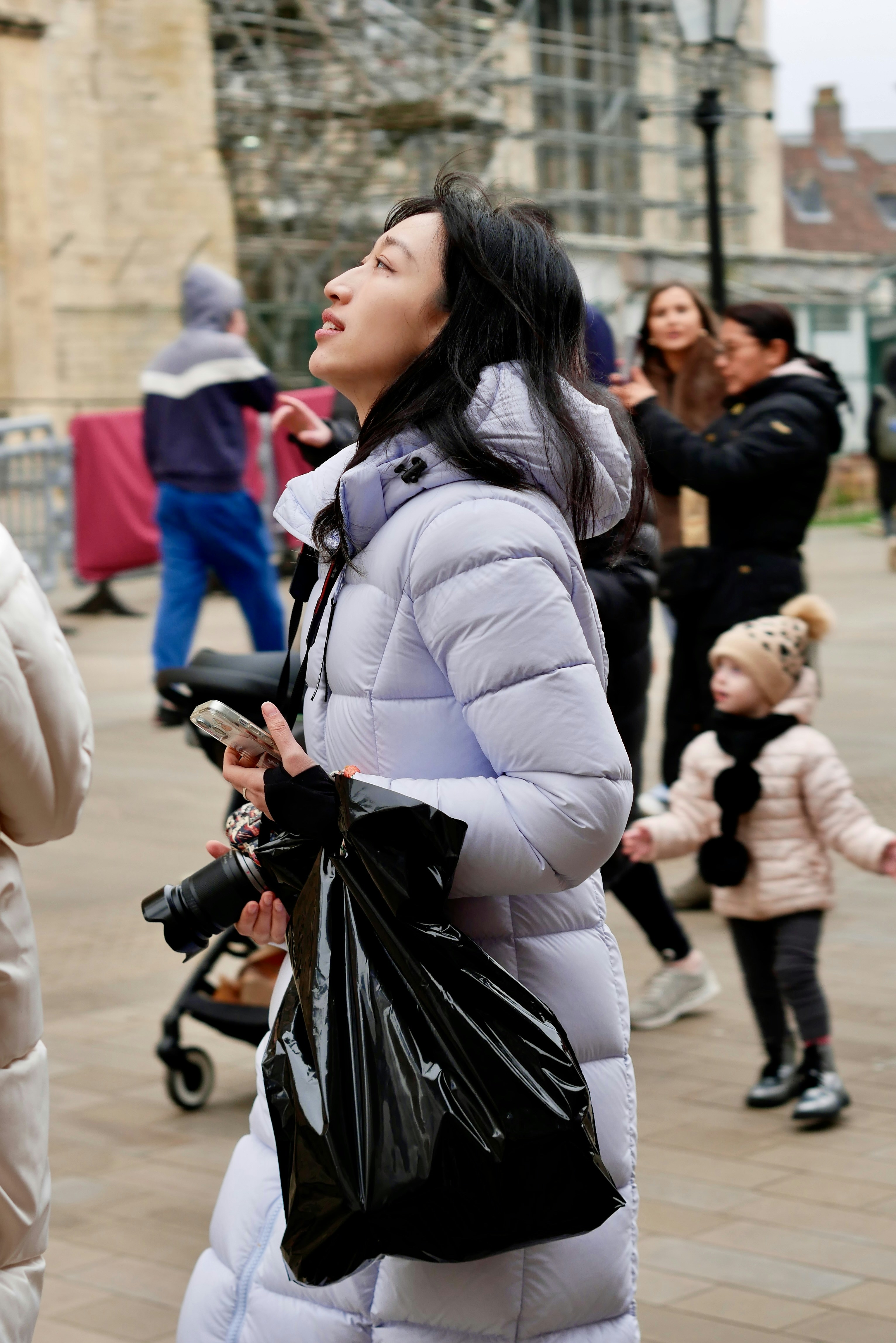 Breath of Moment: A Quiet Glance Amid City Motion