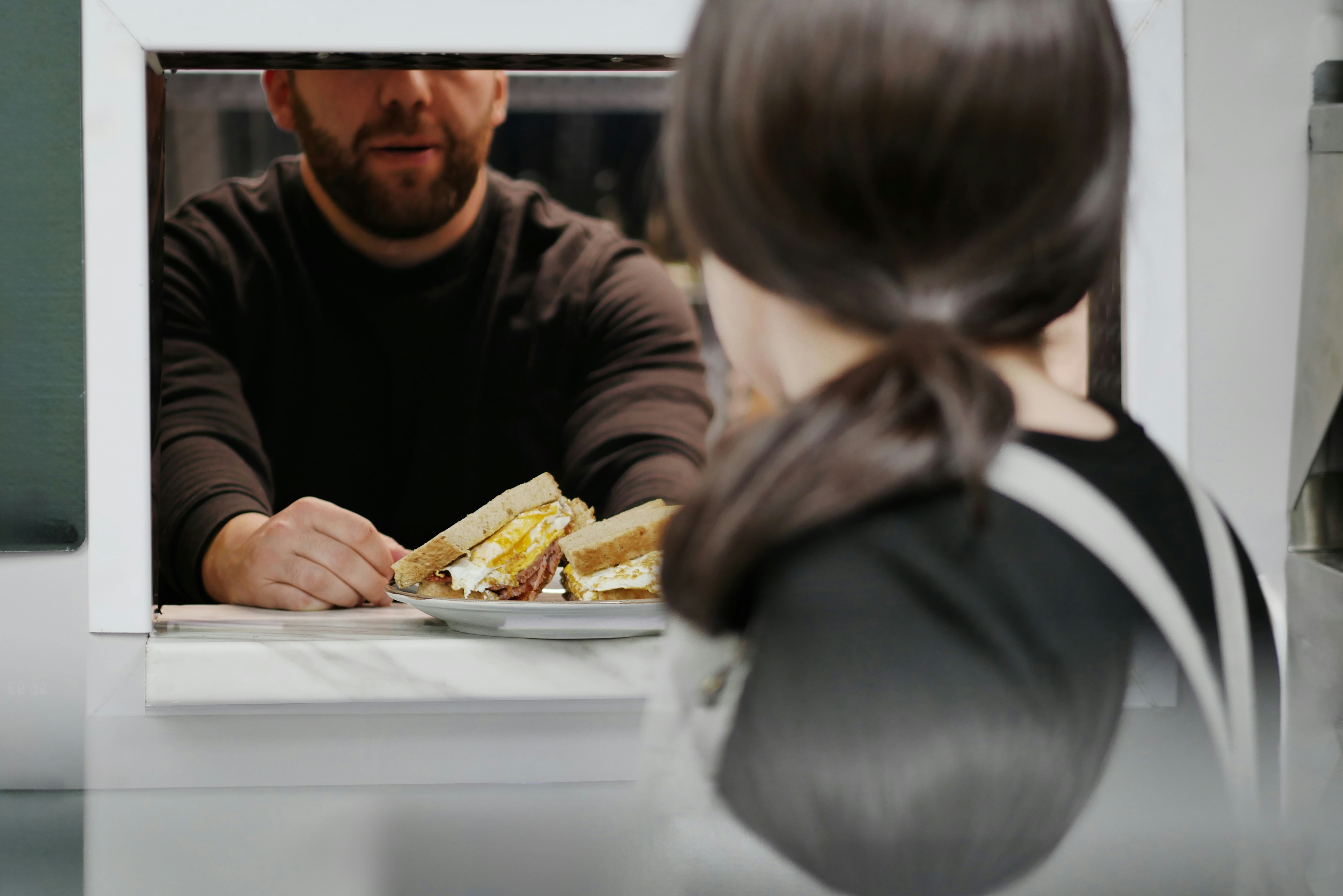 Window Service: A Sandwich Moment Across the Counter