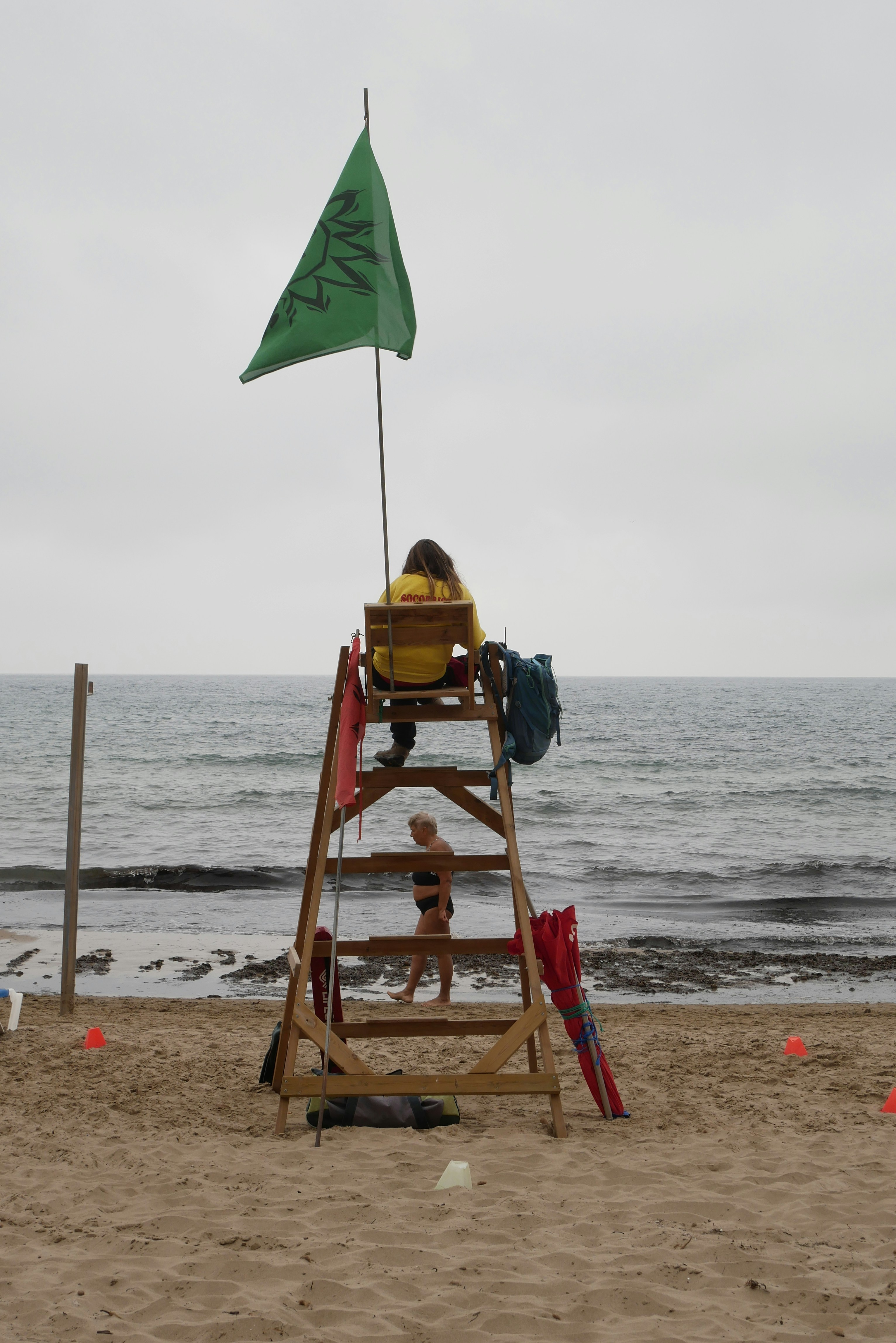 Lifeguard on a Quiet Beach: Watchful Eye Above the Sea