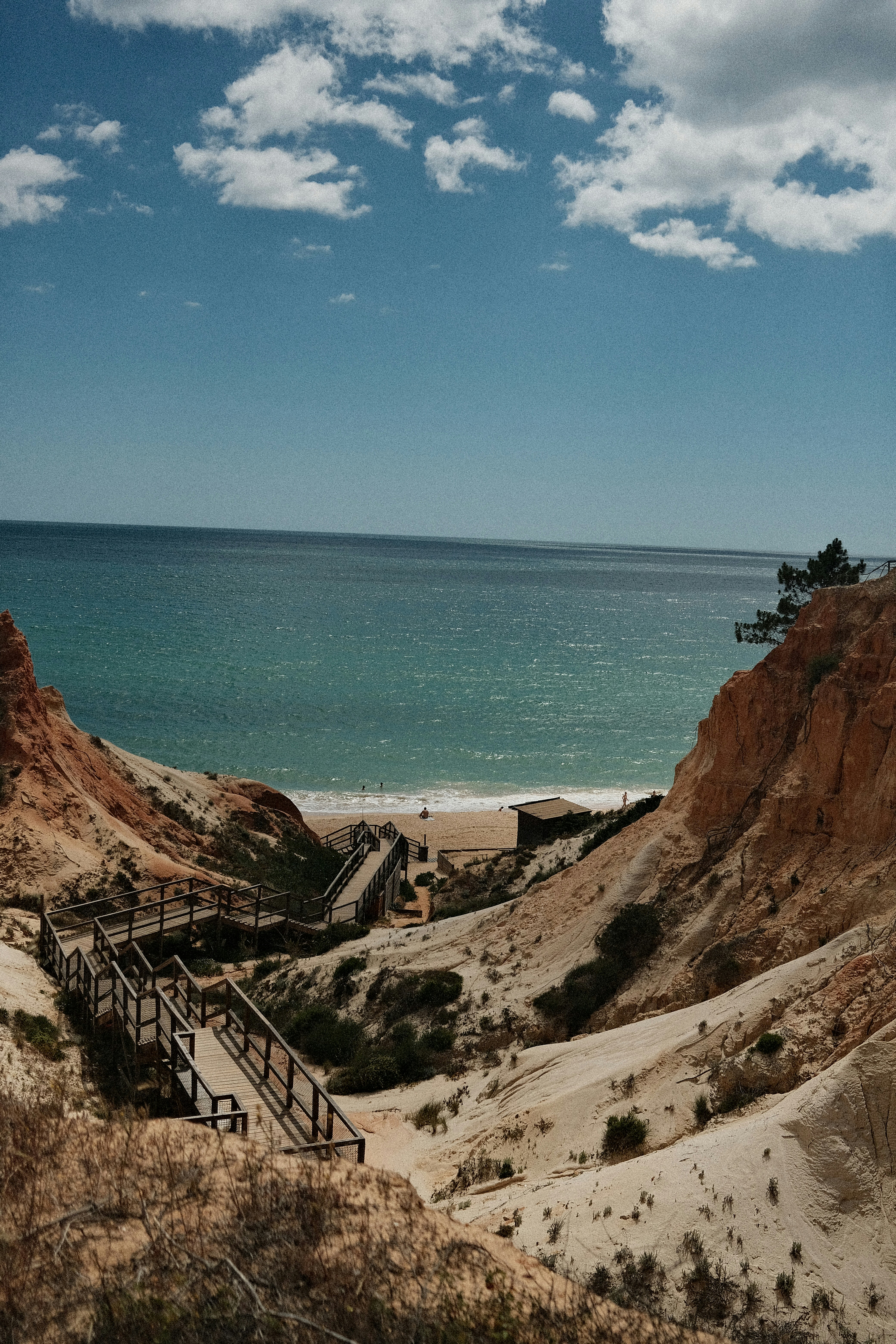 Coastal Staircase to the Sea: Carved Steps Between Cliff Faces
