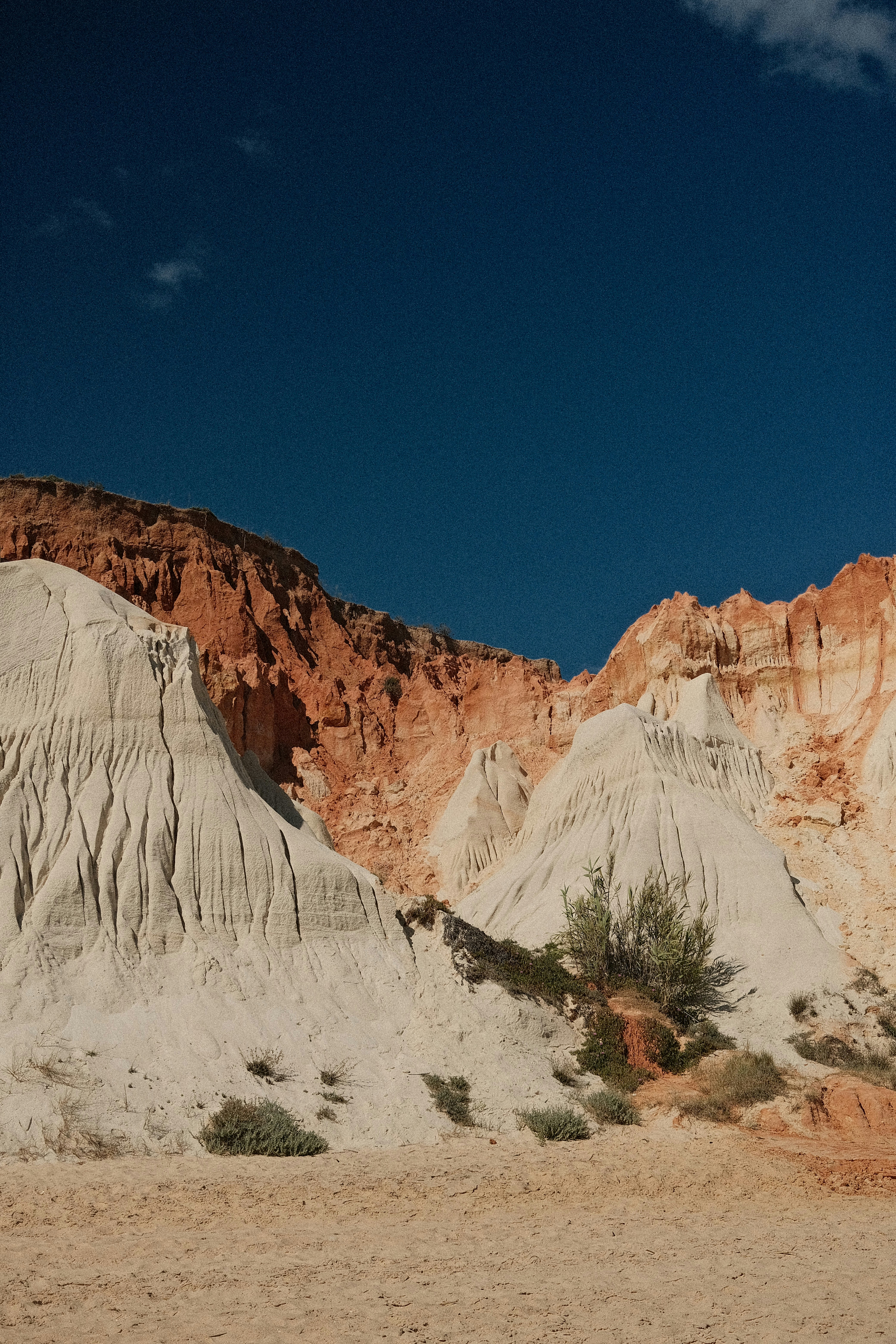 Whispered Pillars of White and Red Cliffs