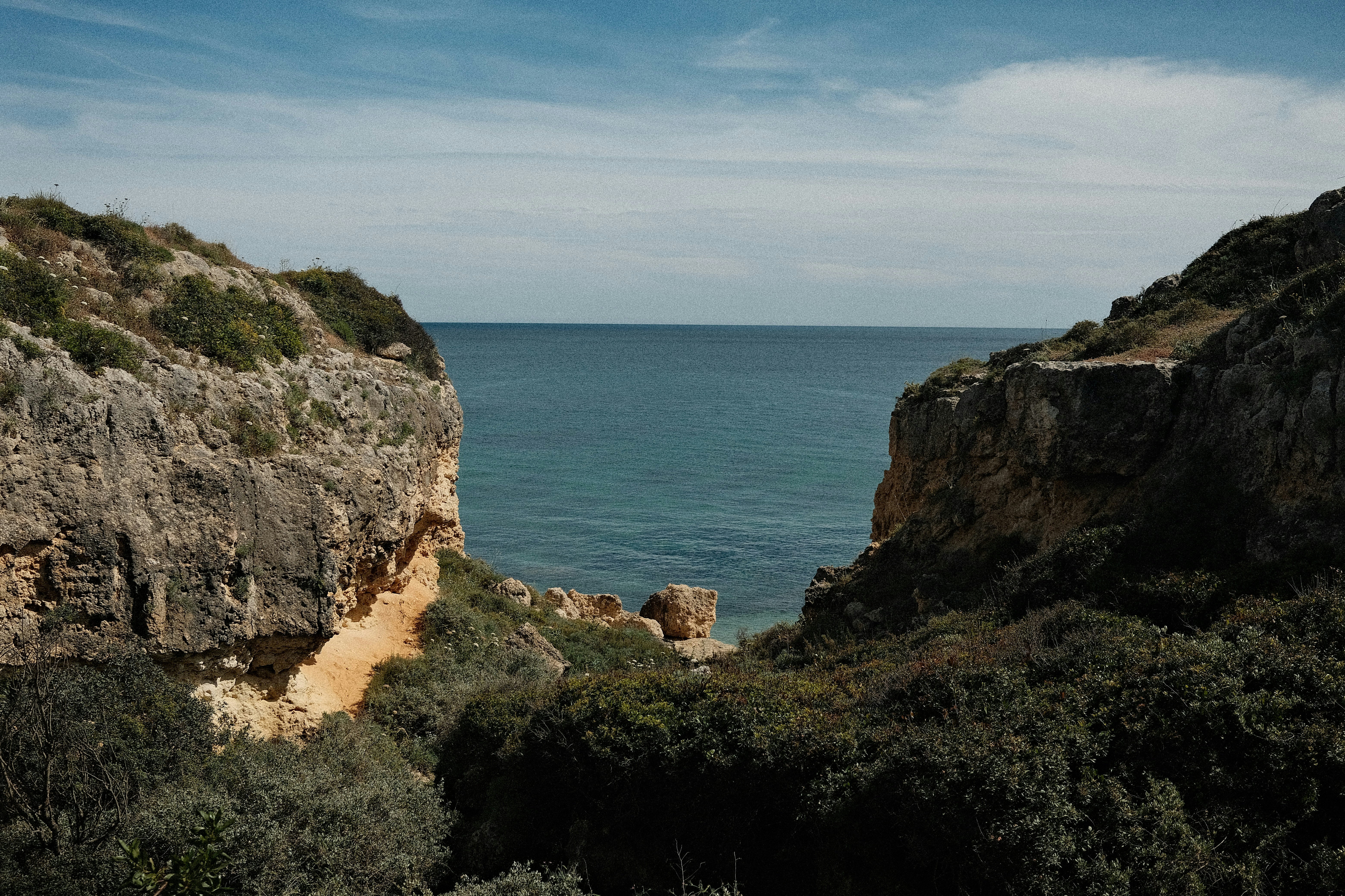 Seaward Gaps: Cliffside Pathway to the Quiet Horizon