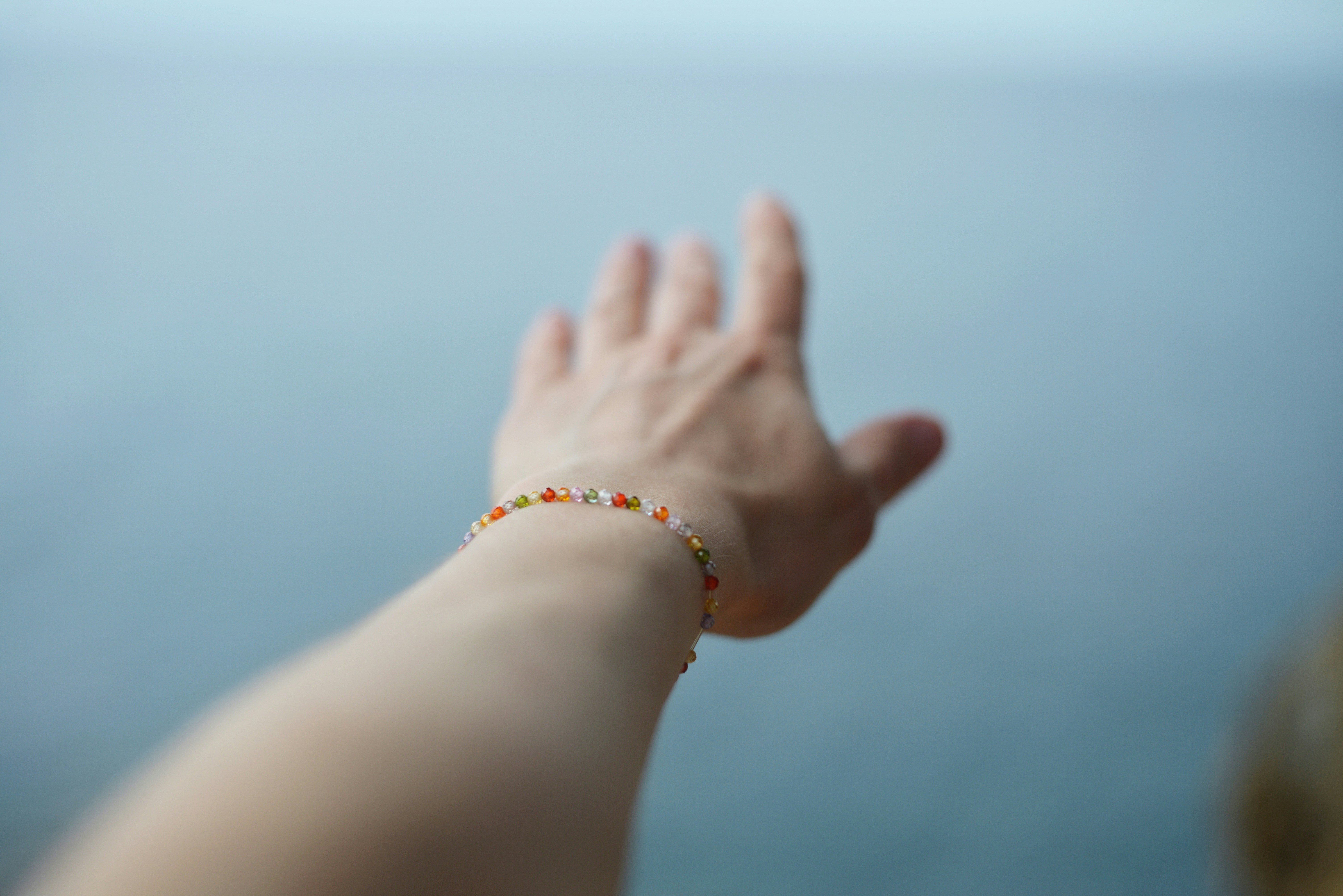 Fading Reach Over a Calm Sea