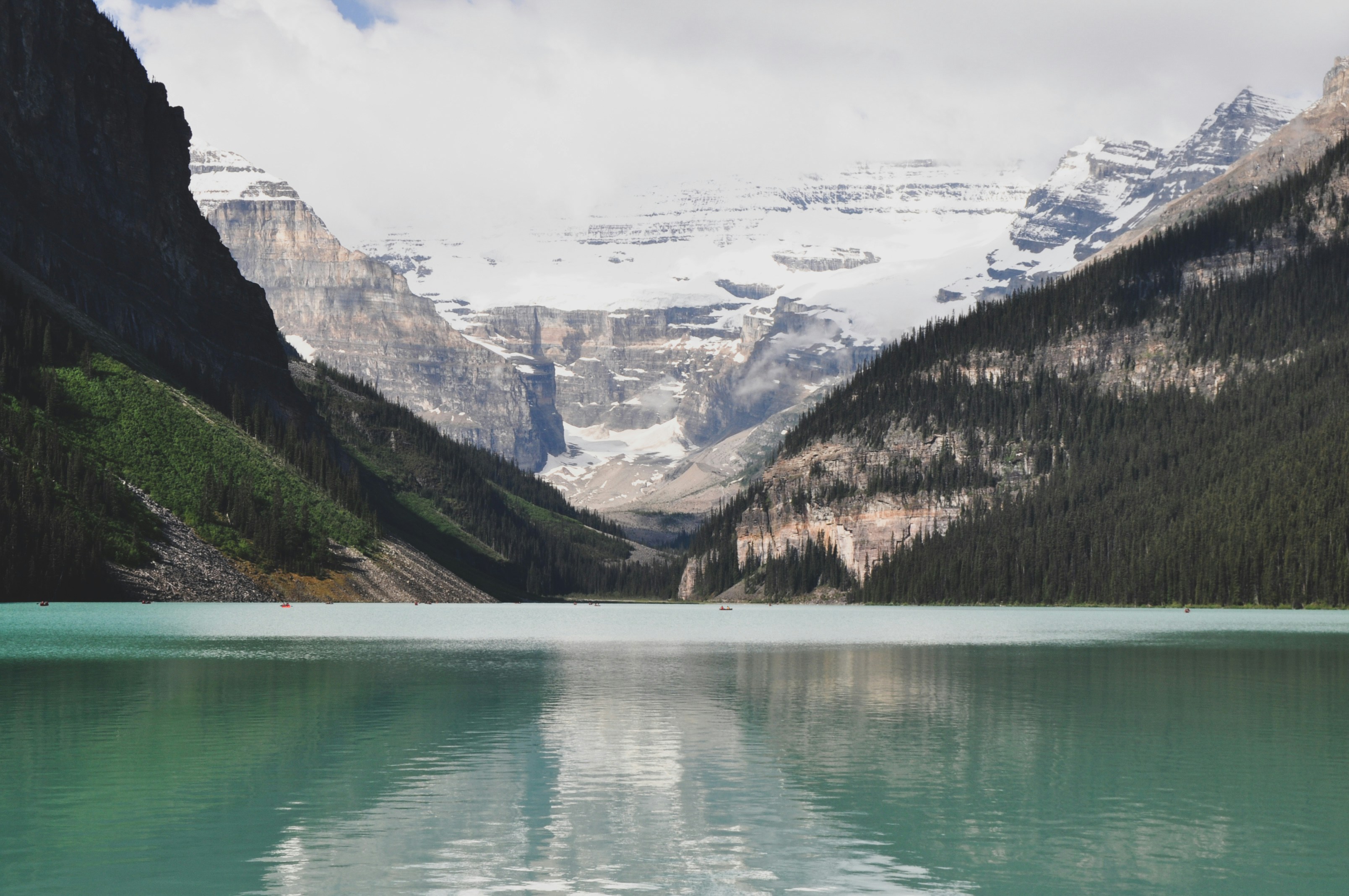 Glacial Mirror: A Serenity of Turquoise Peaks and Lake