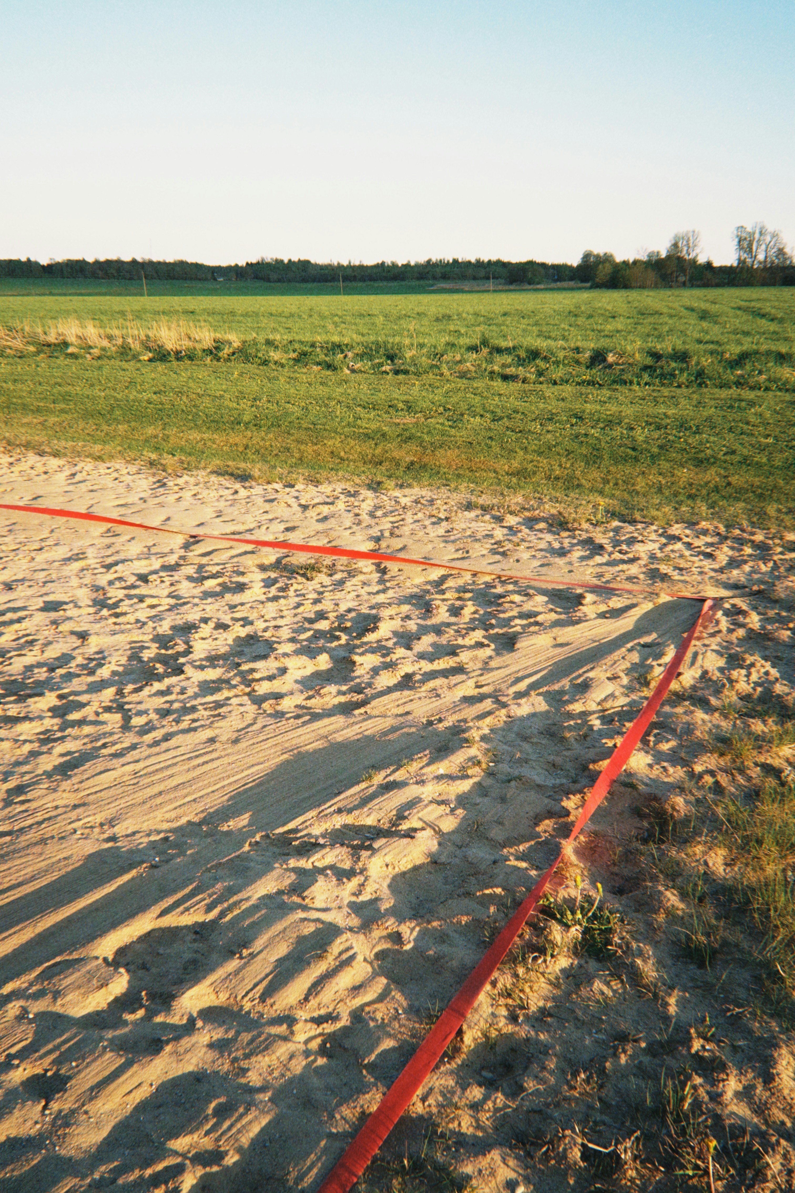 Red Tape Across Sand: Delineating a Field Path into Green Horizon
