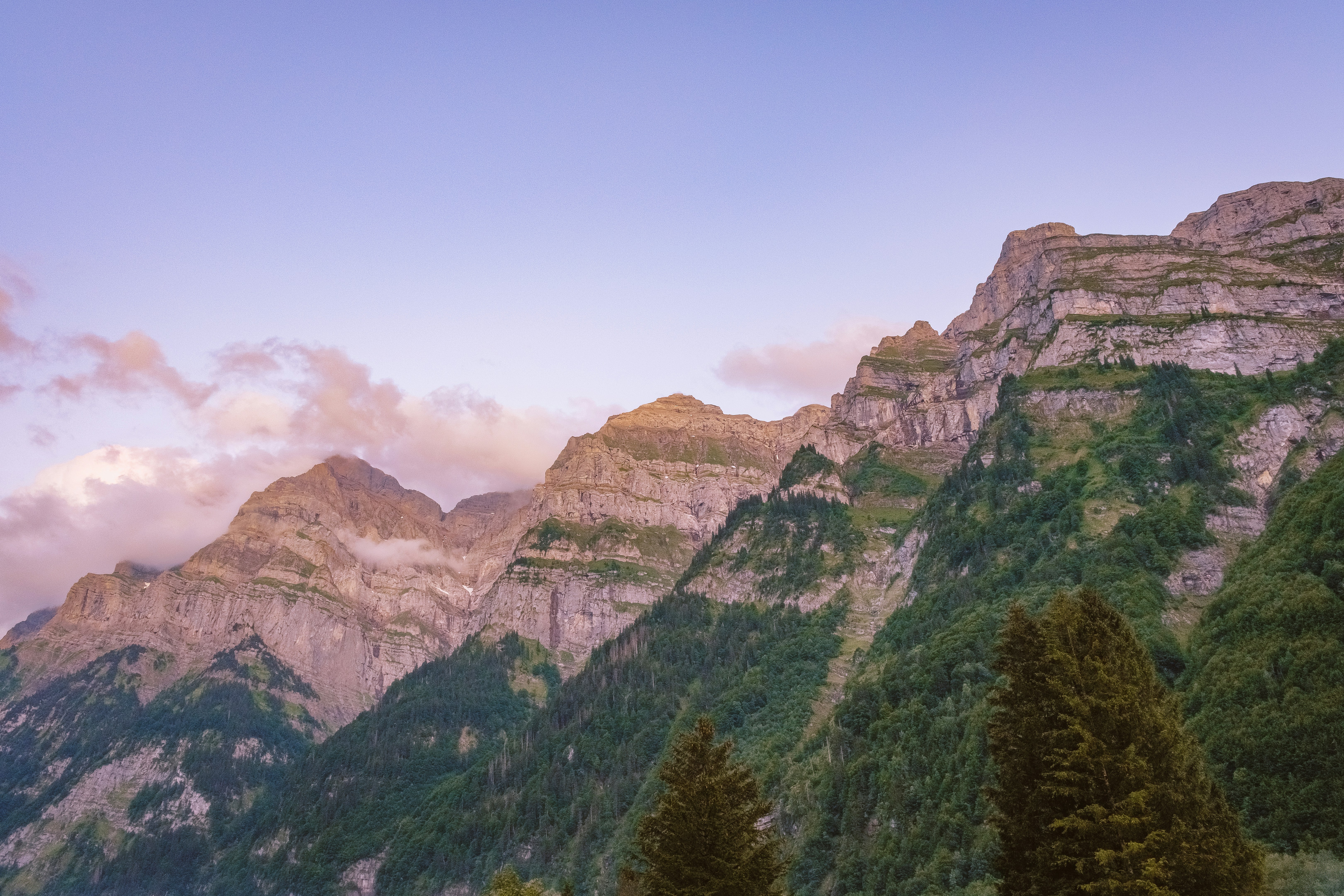 Sunlit Ridge: A Quiet Ascent Beneath Craggy Peaks