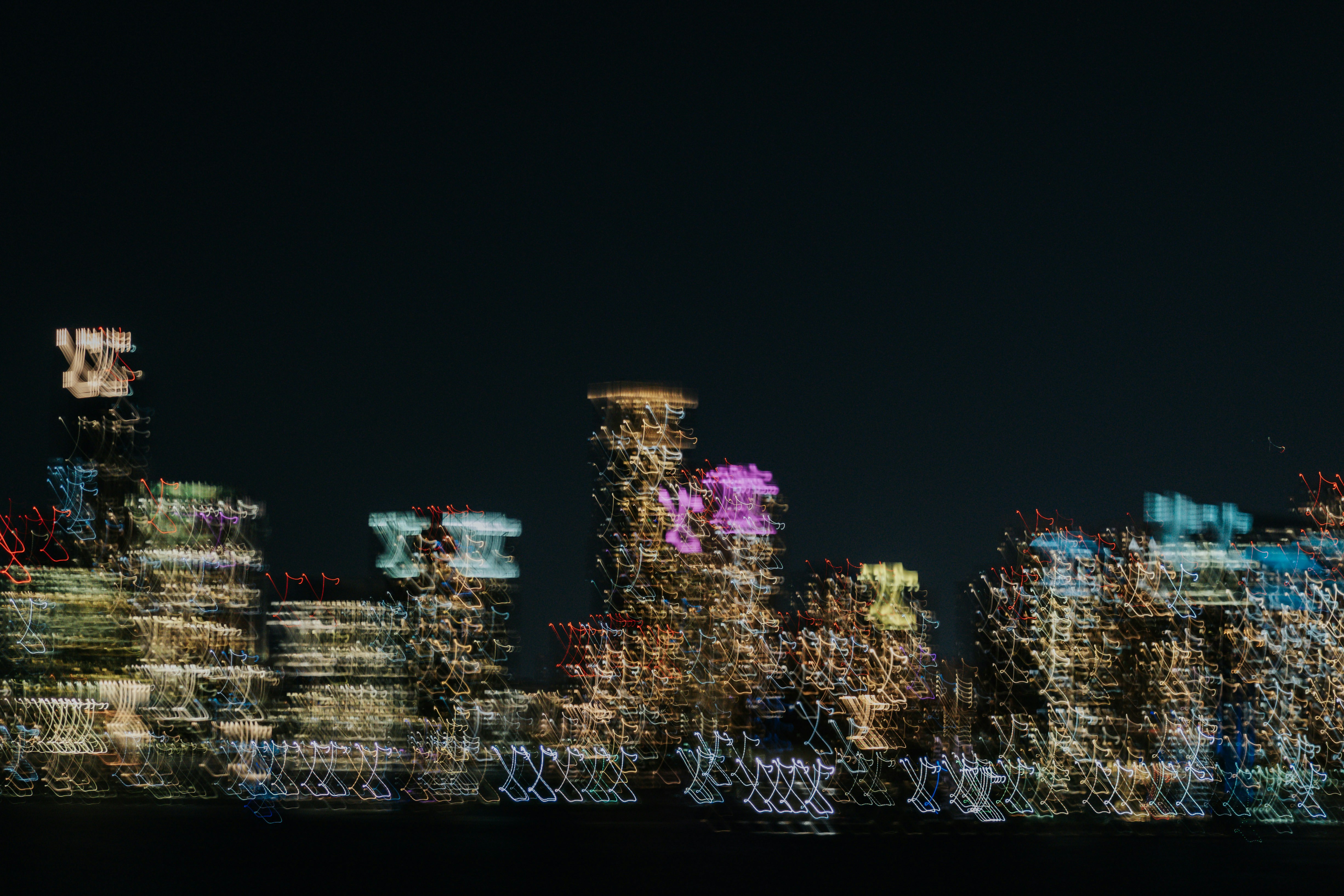 Midnight City Lights in a Blur of Color and Motion
