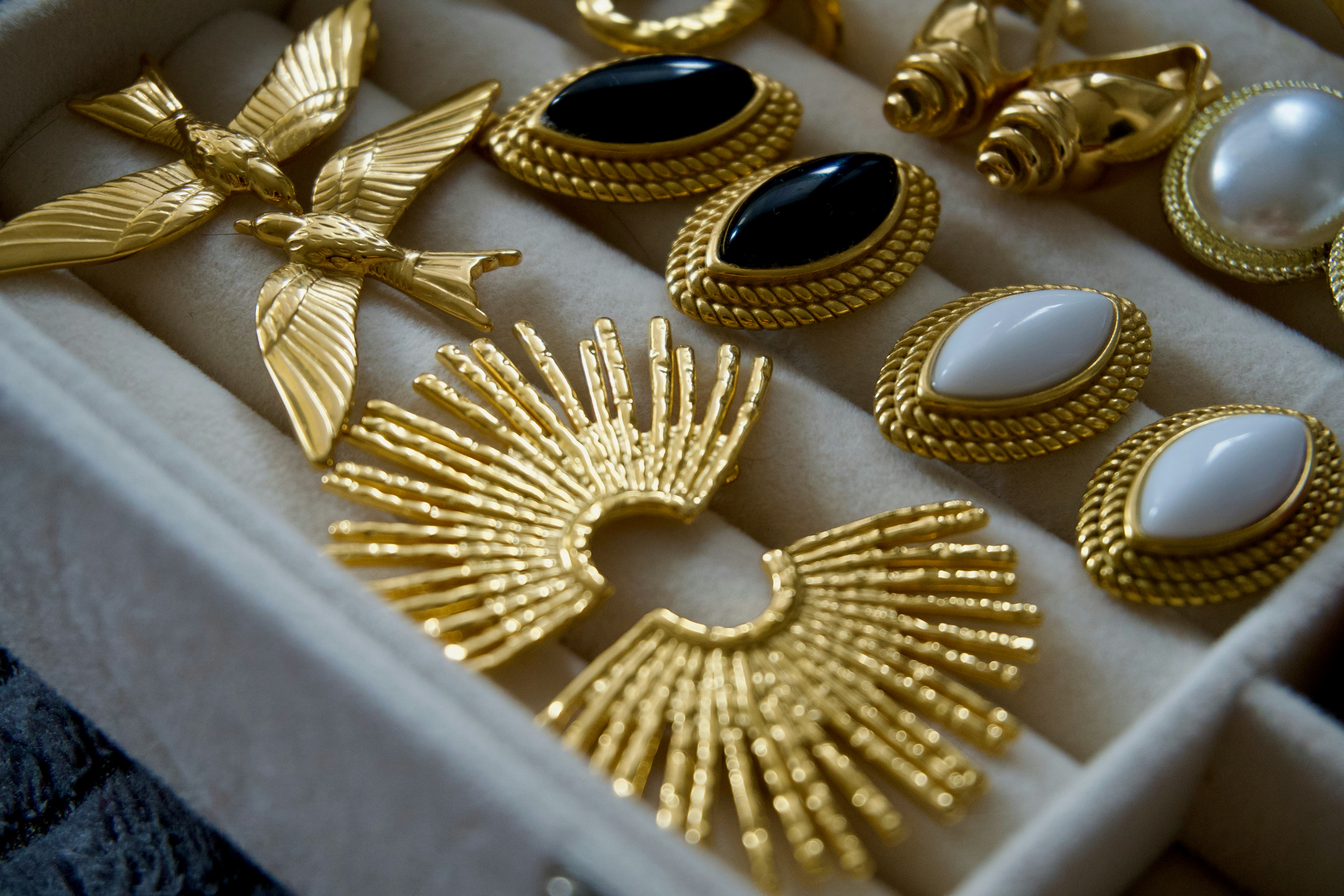 Golden Accents: Jewelry Treasure in a Velvet Drawer