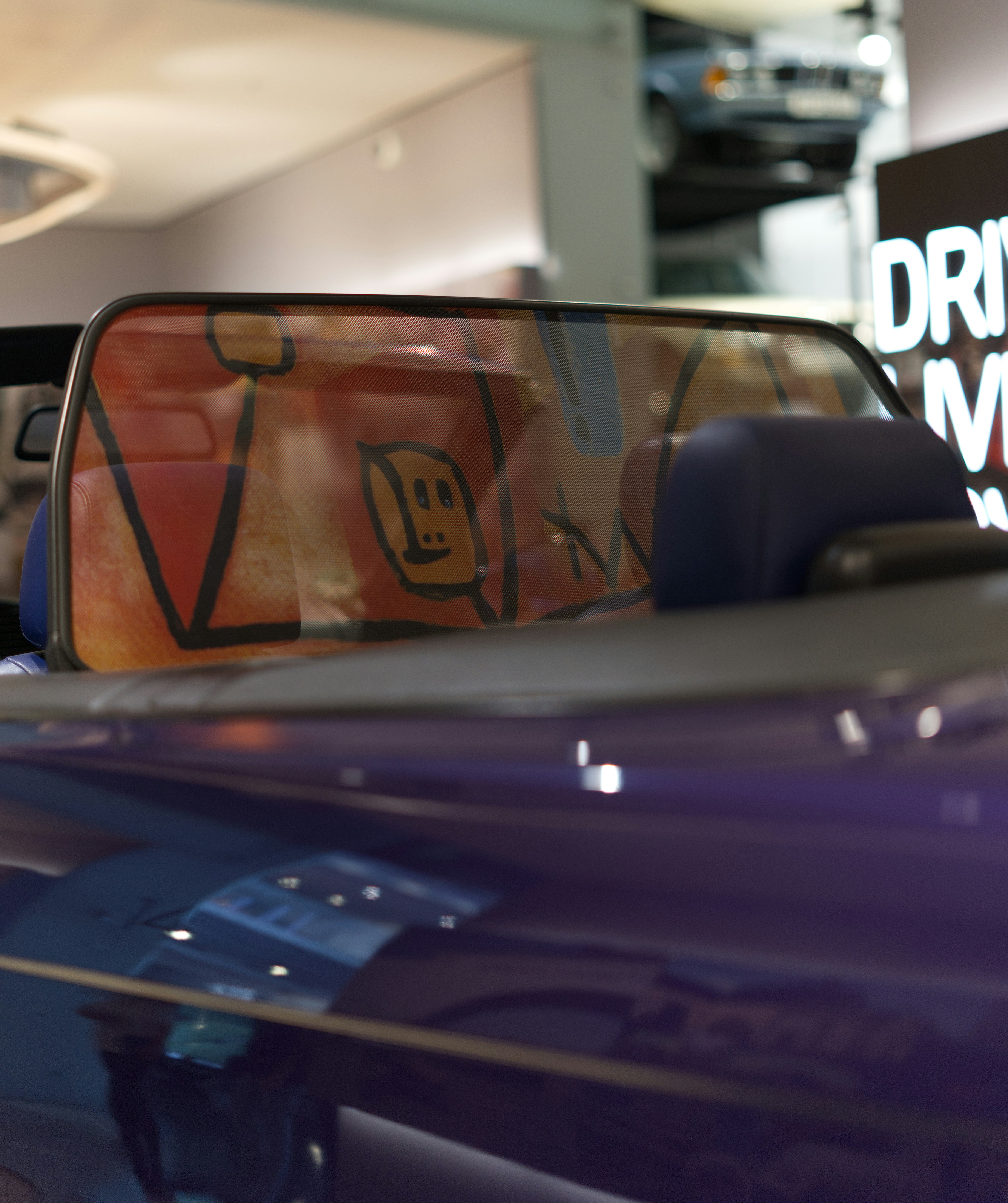 The Reflective Ribbon: A Convertible’s Glass Whisper