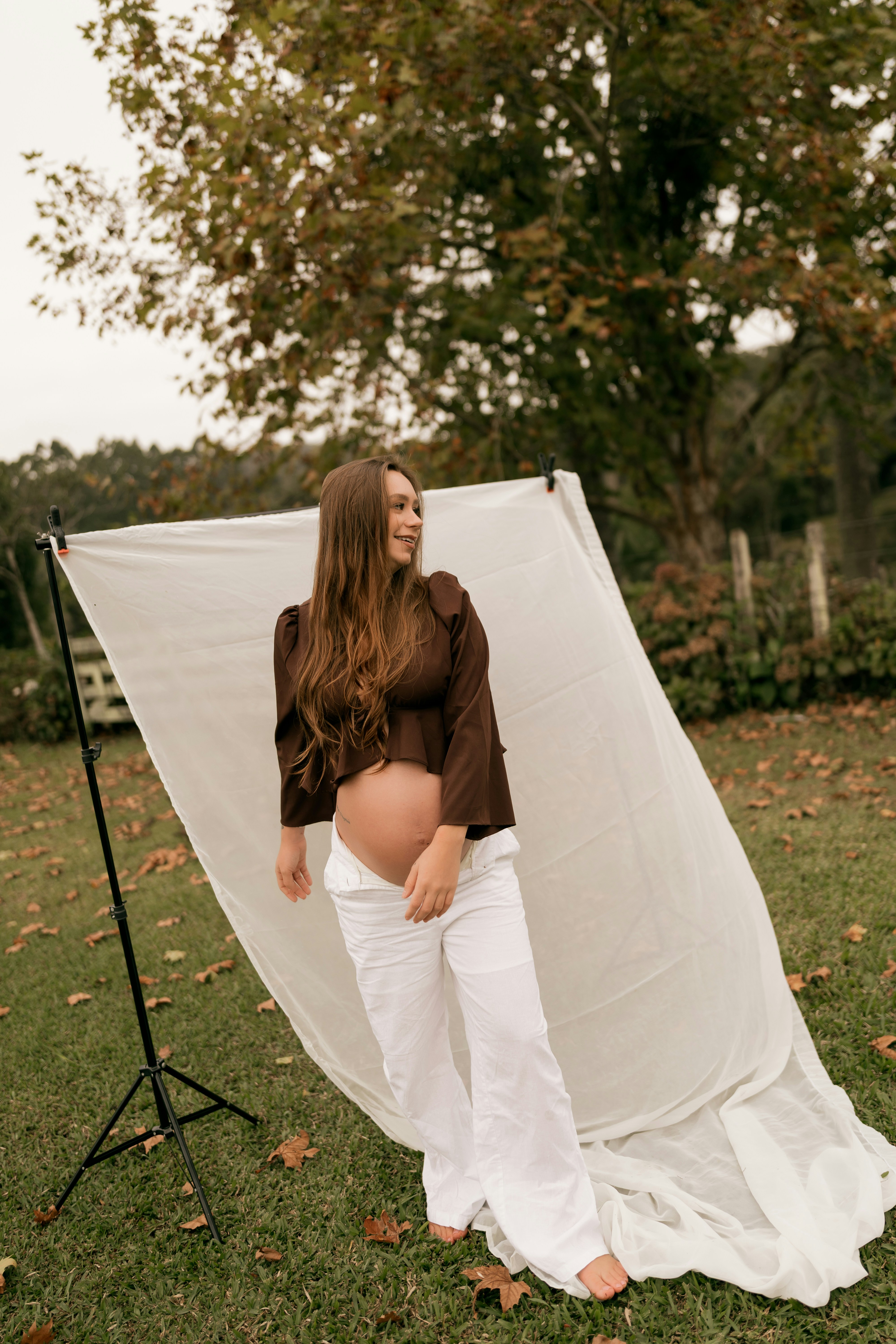 Golden Hour Expectant: A Maternity Portrait Draped in White