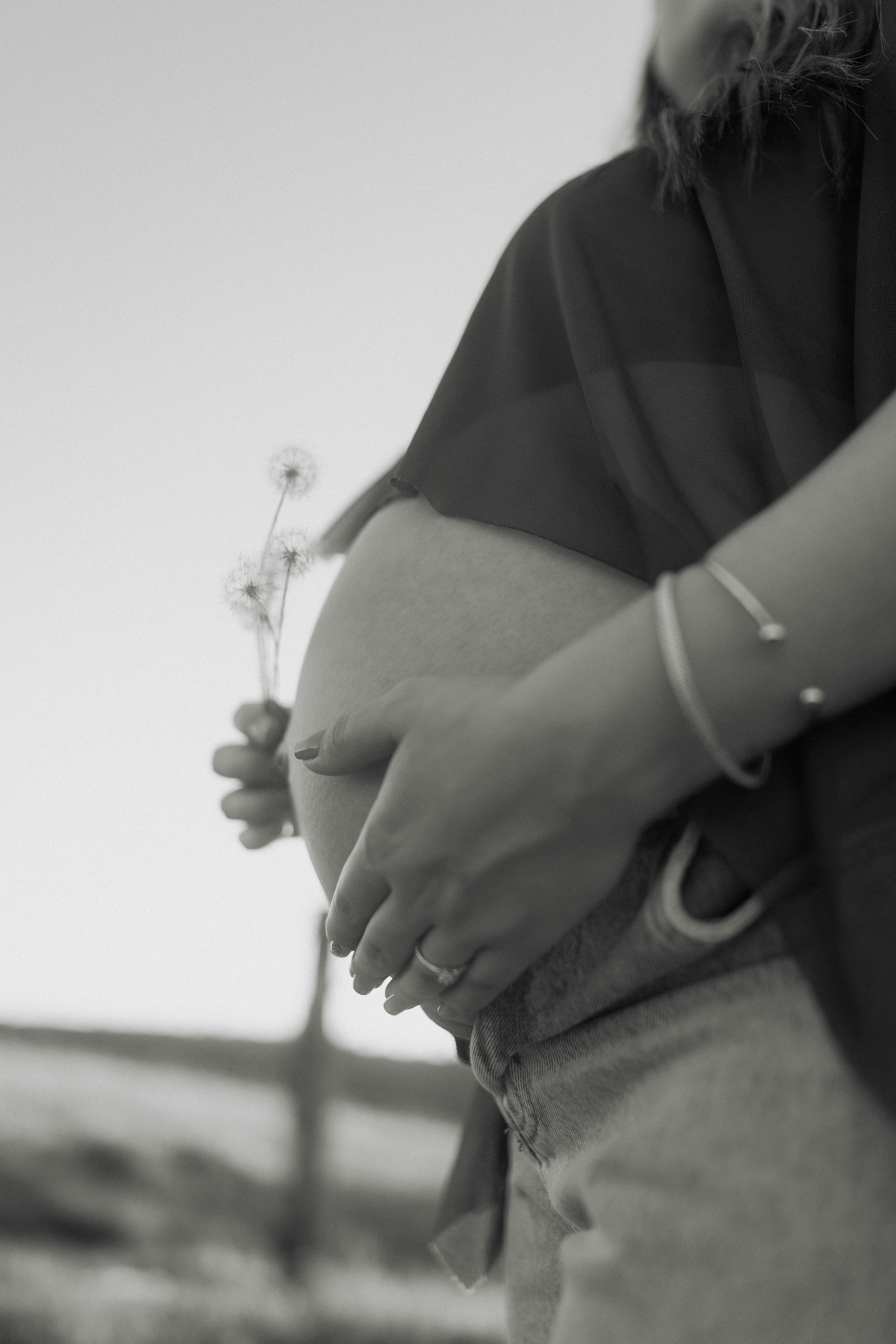 Beyond Expectation: A Maternity Moment Framed in Soft Light