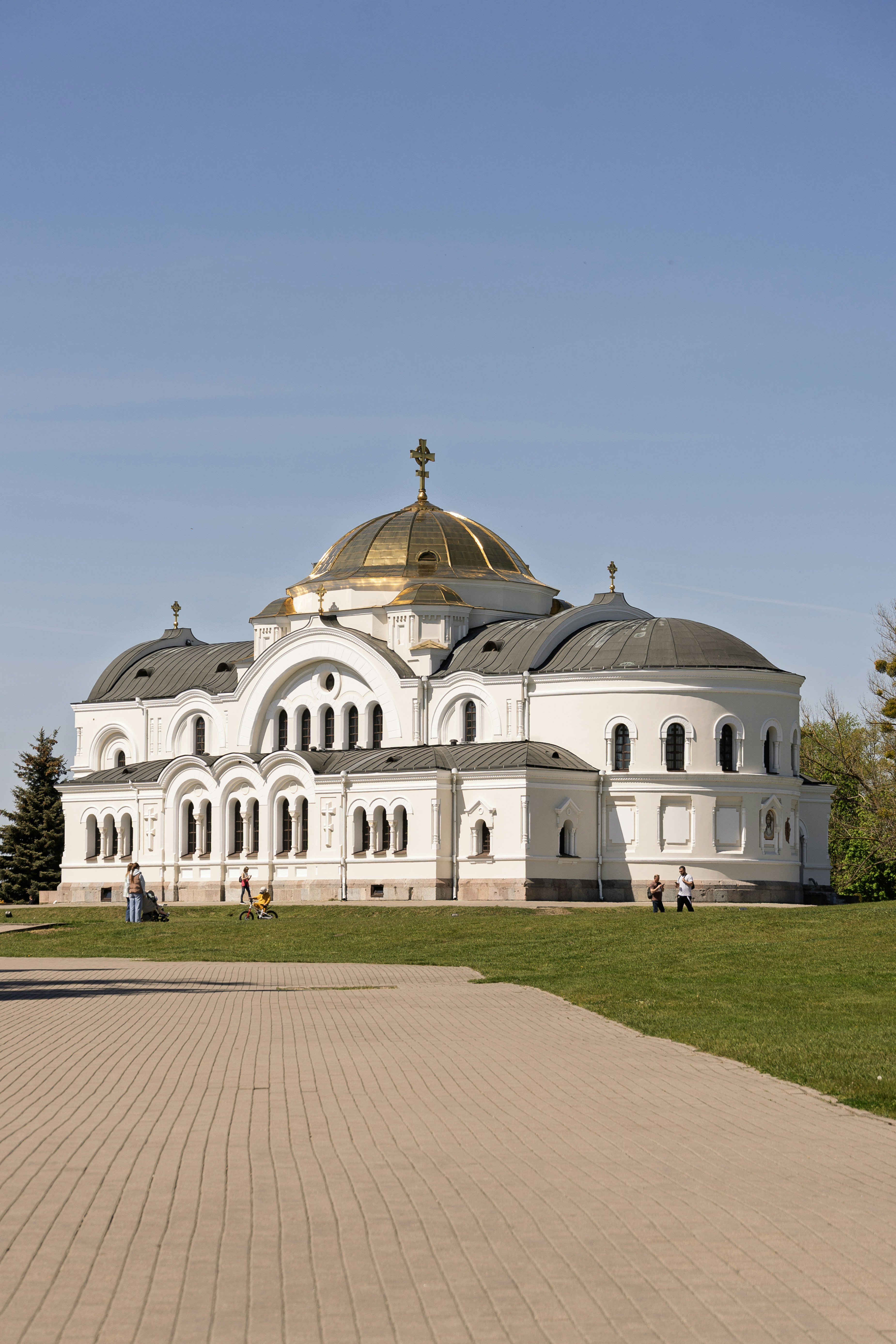 White Byzantine-style Church with Golden Dome Under Clear Sky