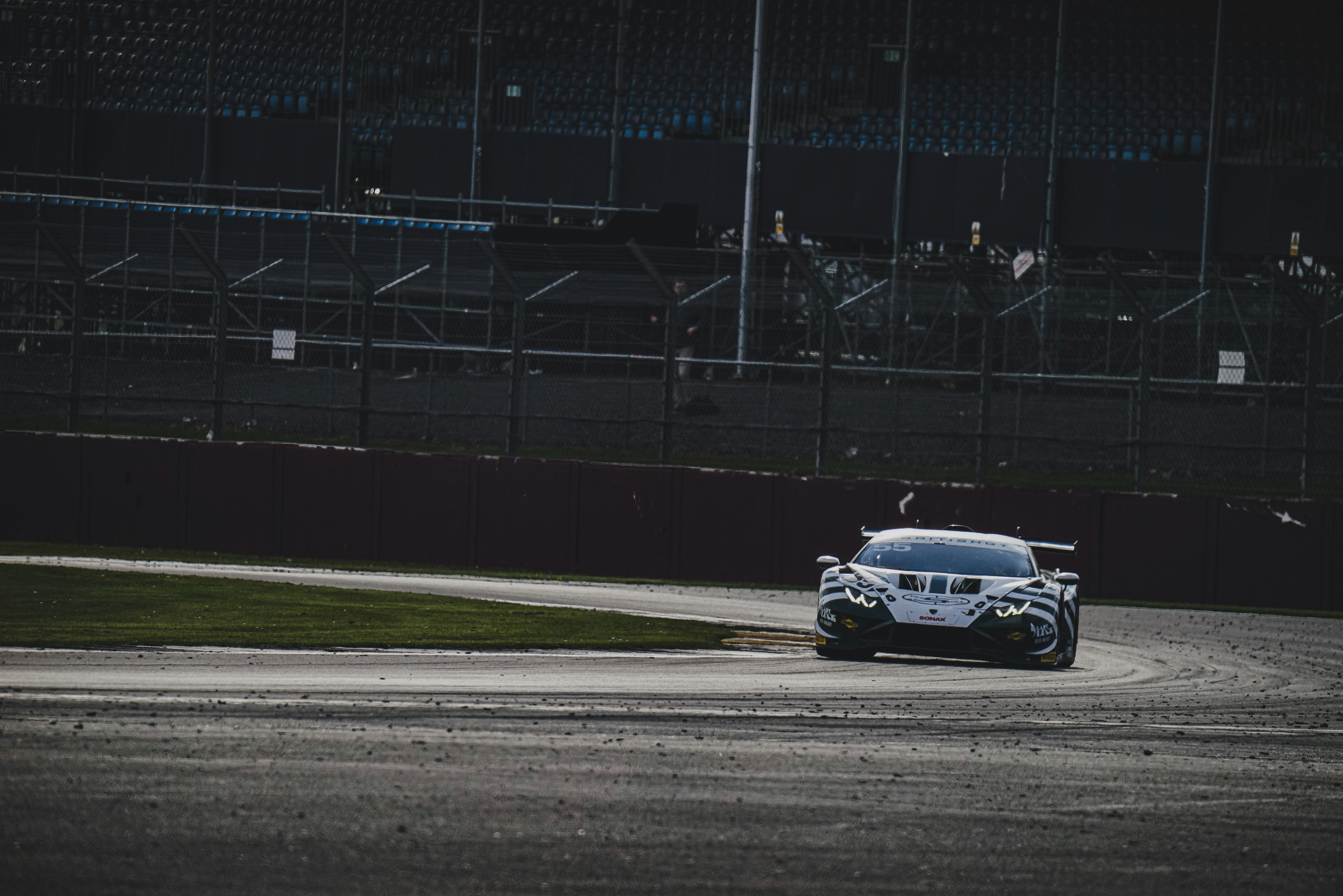 Racecar Emerging from the Shadows: Precision on a Dim Track