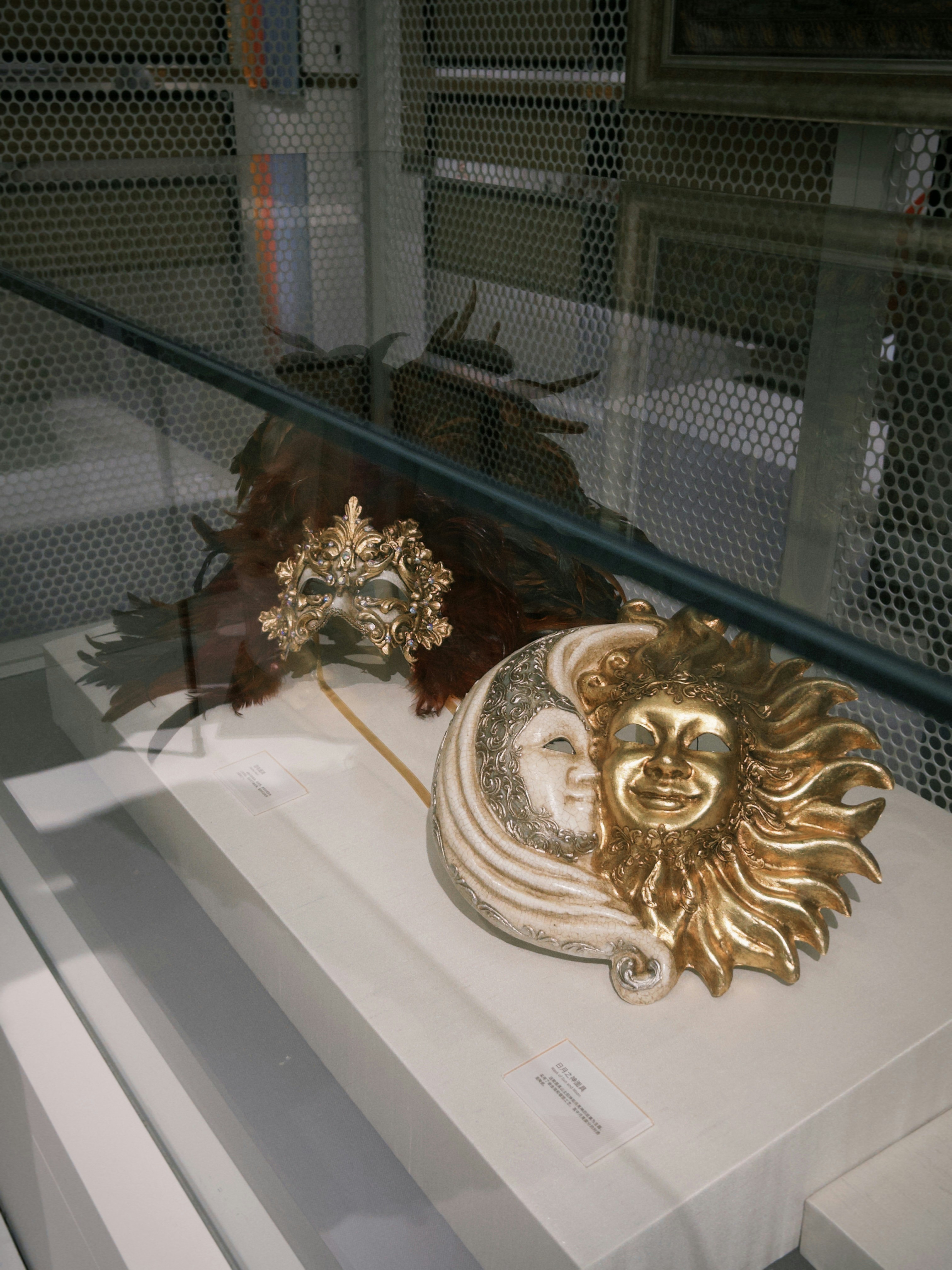 Masks in Glass: A Display of Time and Light