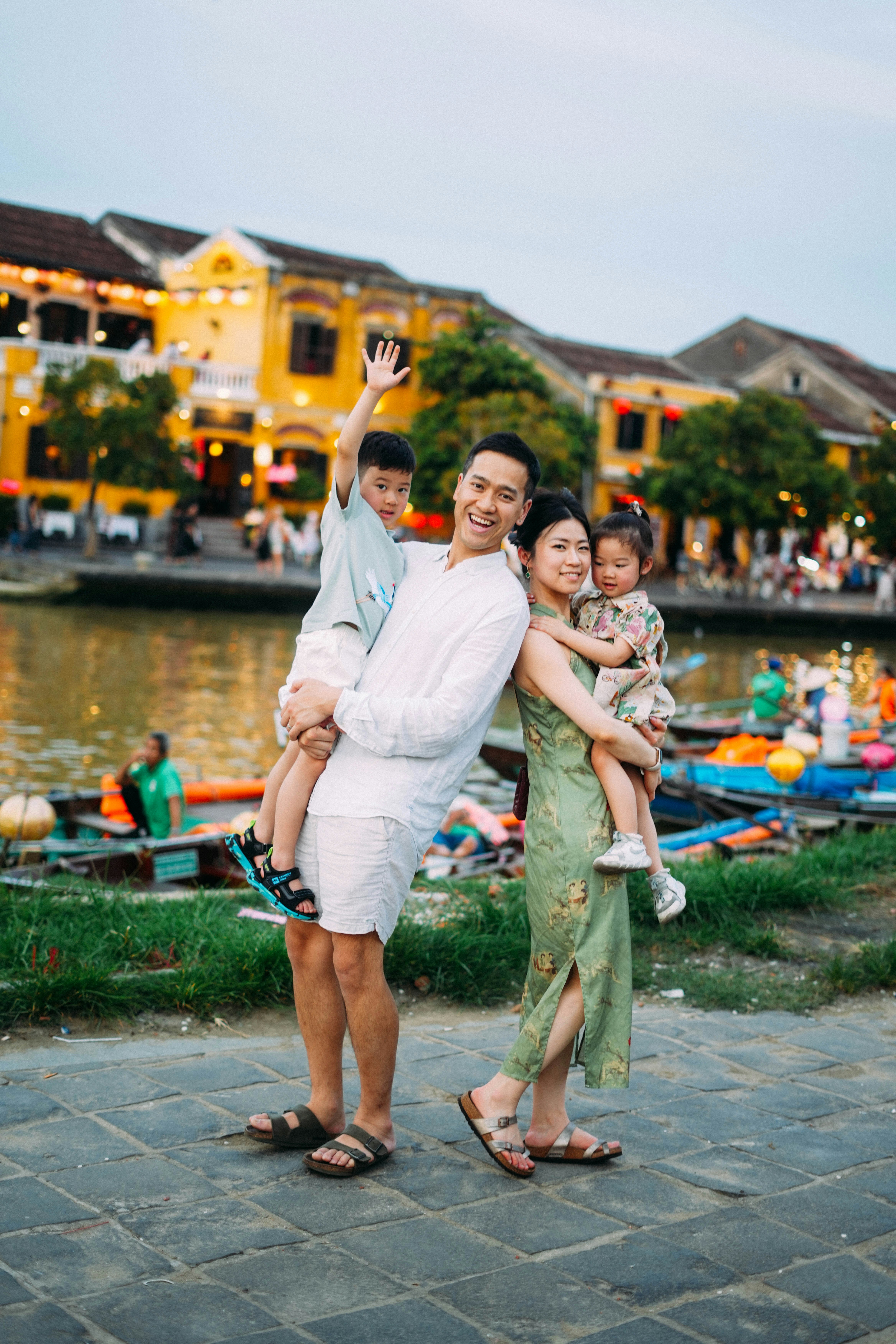 Joyful Family At the Riverside Village