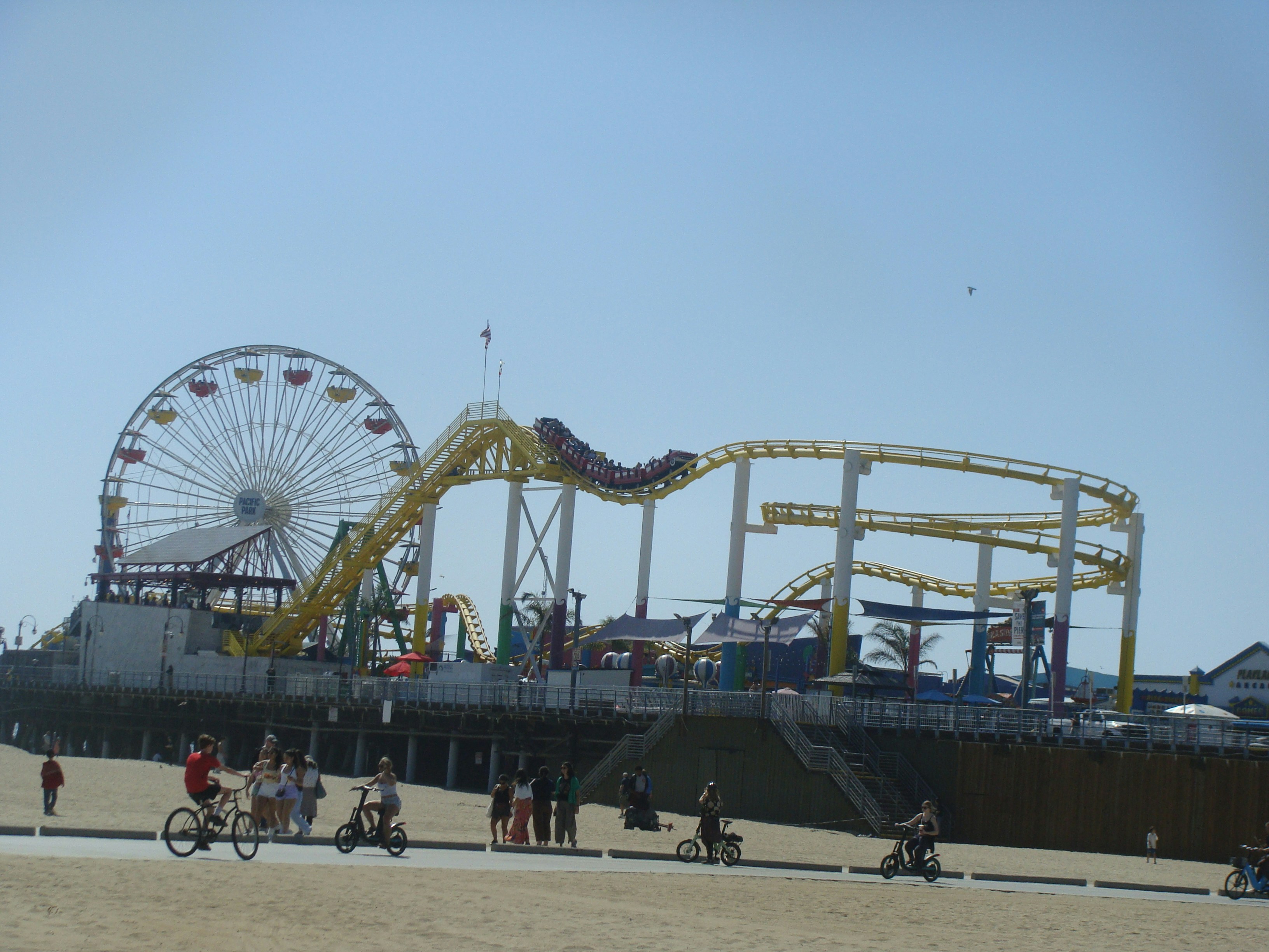 Sunlit Pierside Carousel: A Relaxed Day by the Ride-Deck