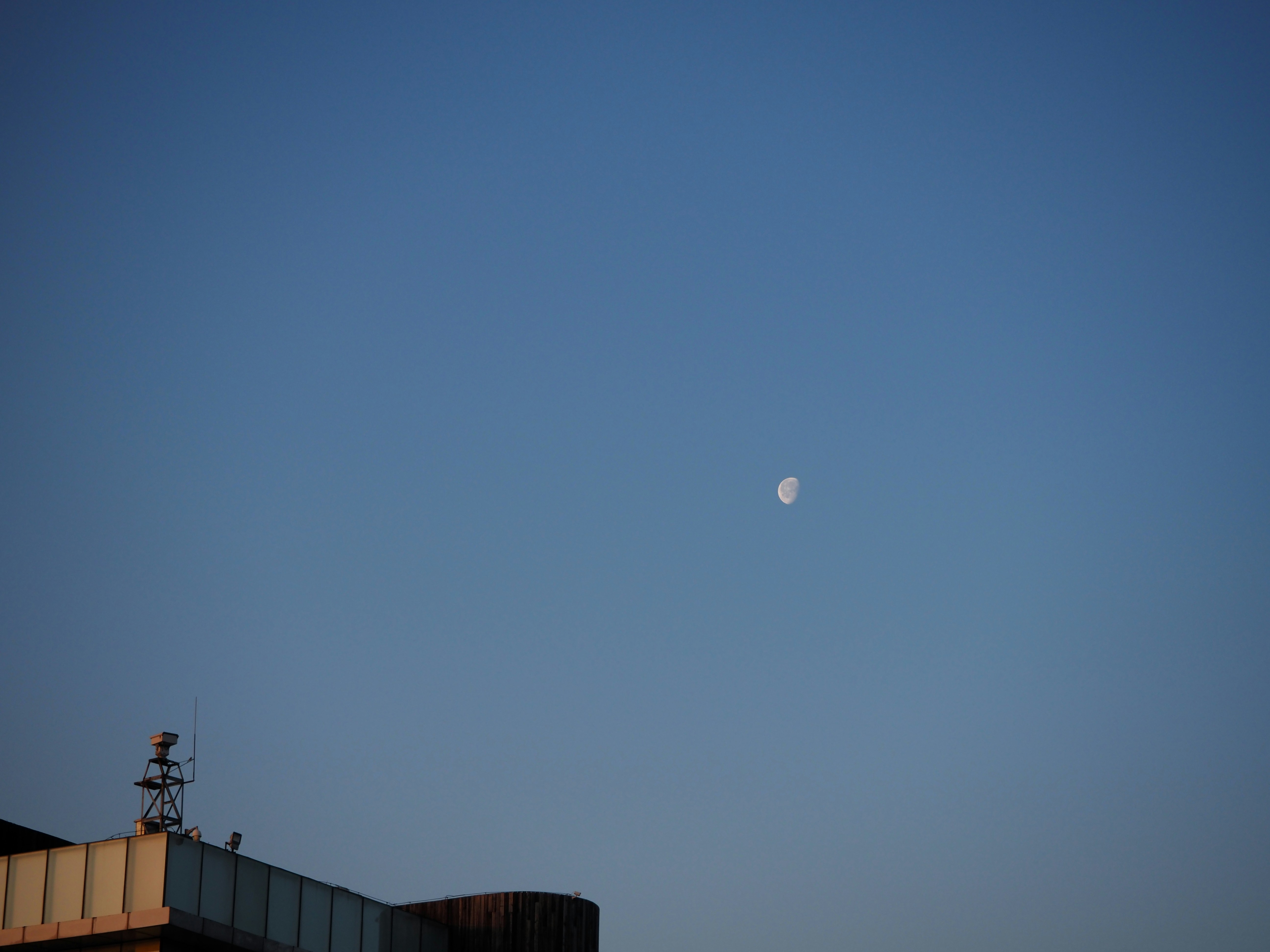 Moon over a Quiet Rooftop