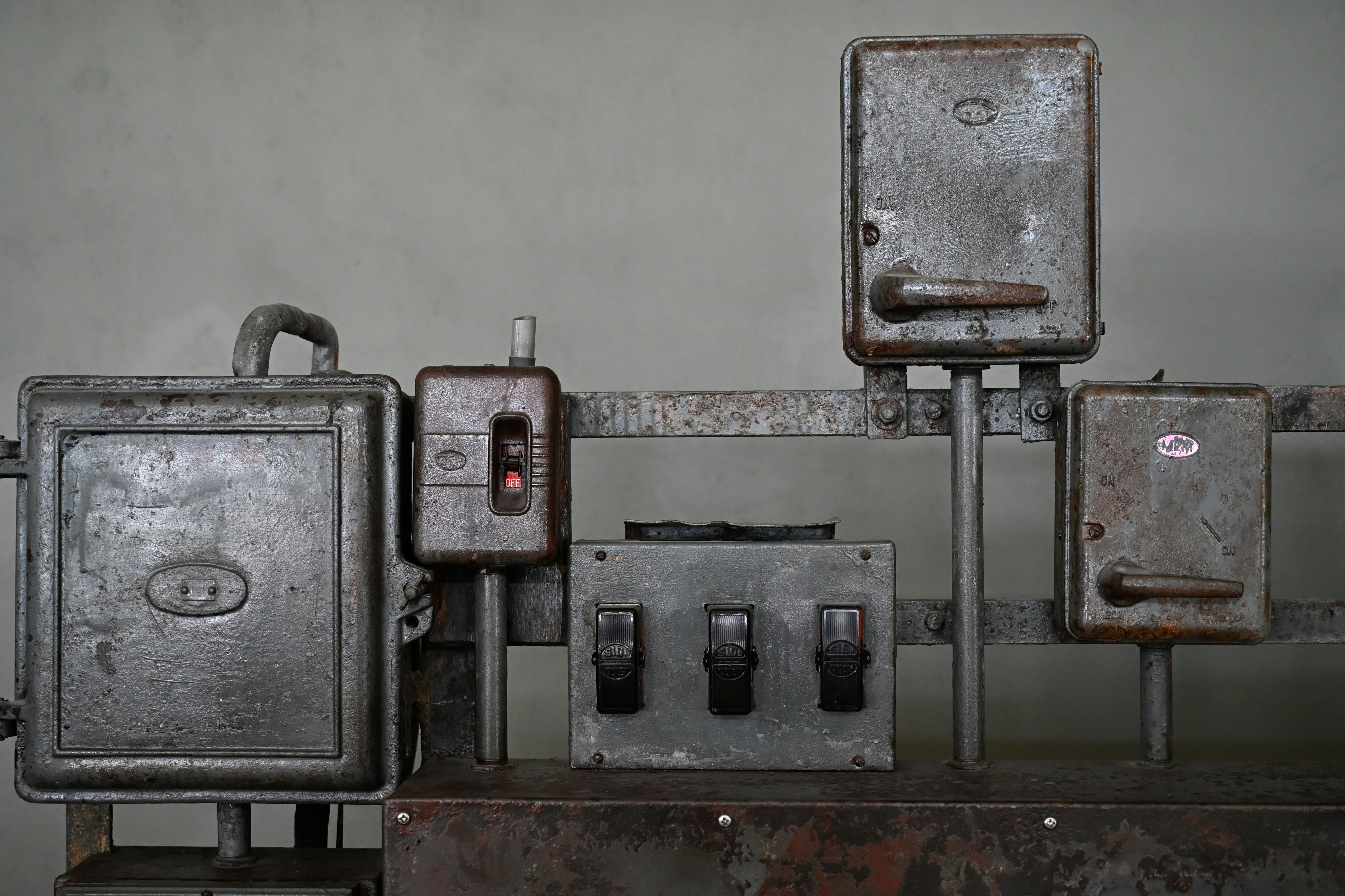 Industrial Metal Arc: A Rusted Control Panel Through Time
