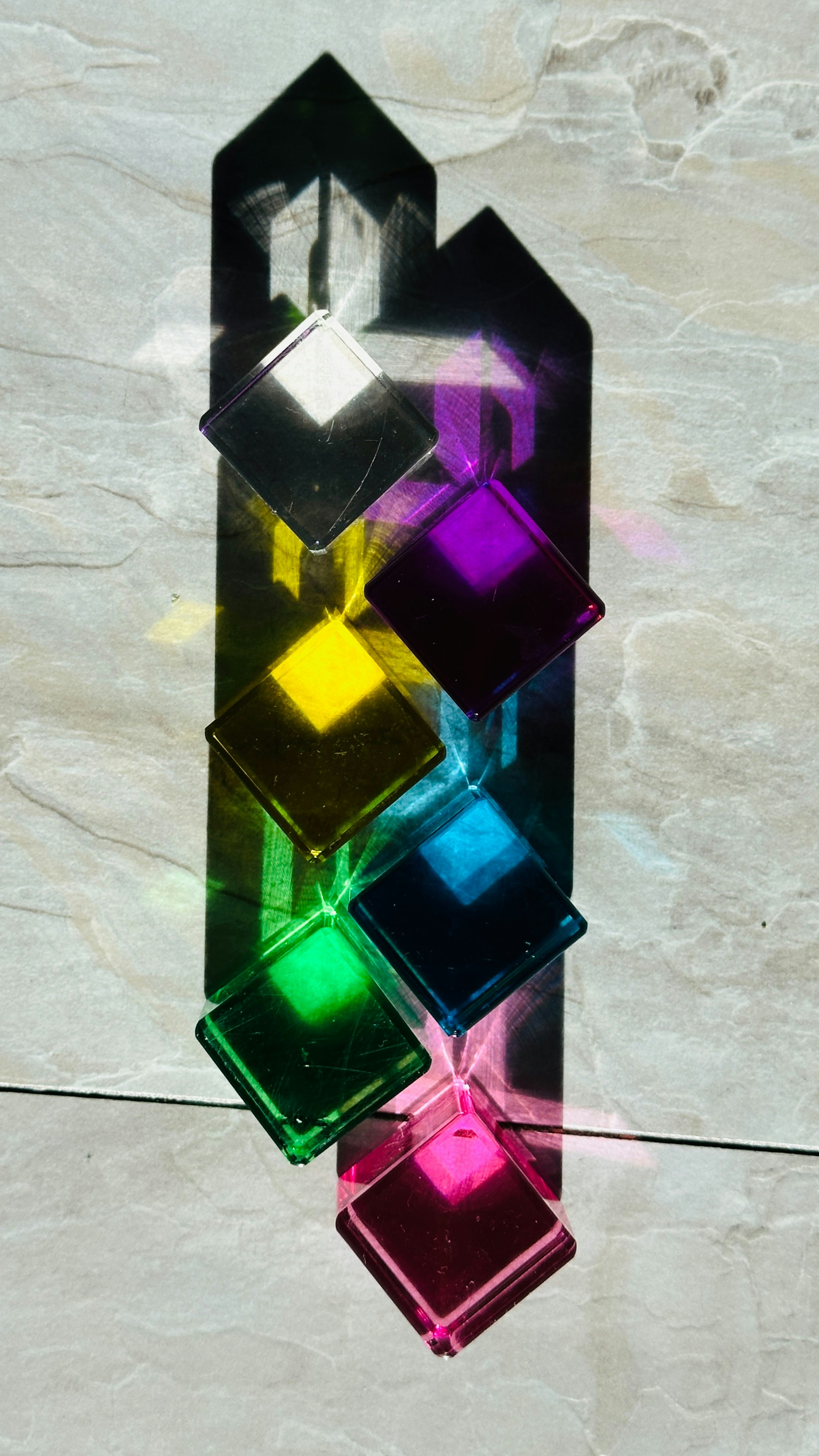 Prismatic Shadow cascade over pale stone