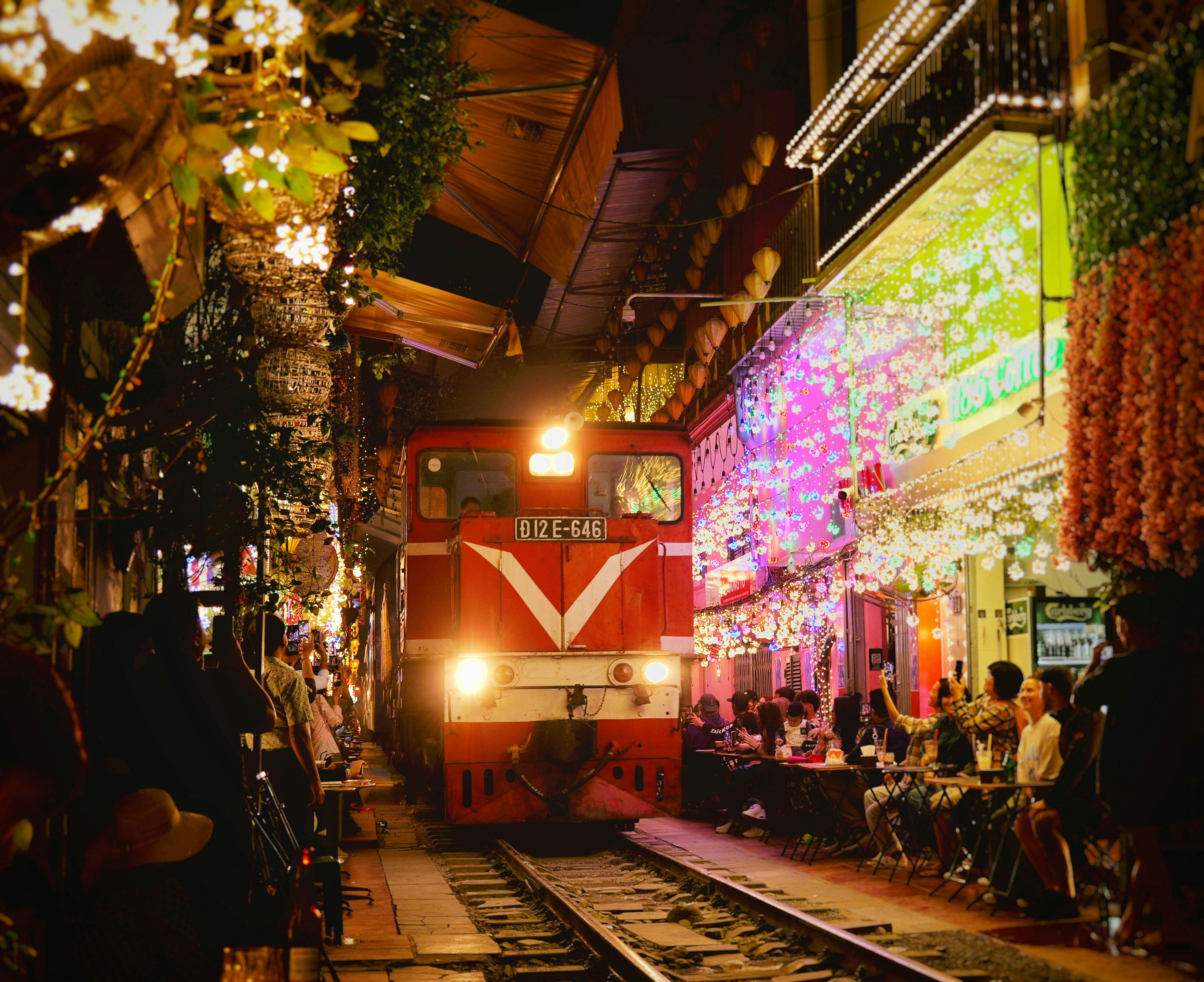 Midnight Metro Parade: A Neon-lit Rail Through a Festive Lane