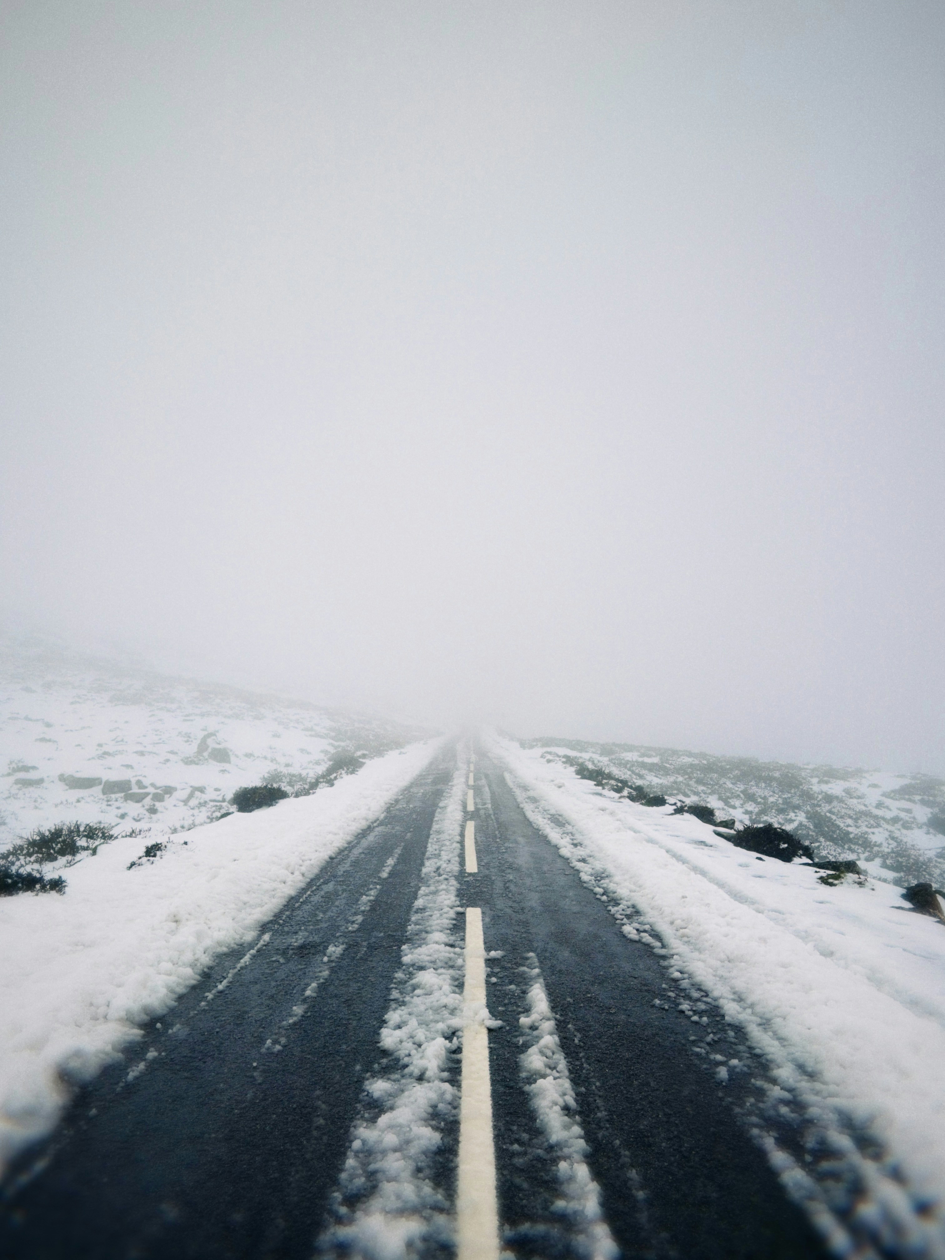 Endless Road Through Winter Mist