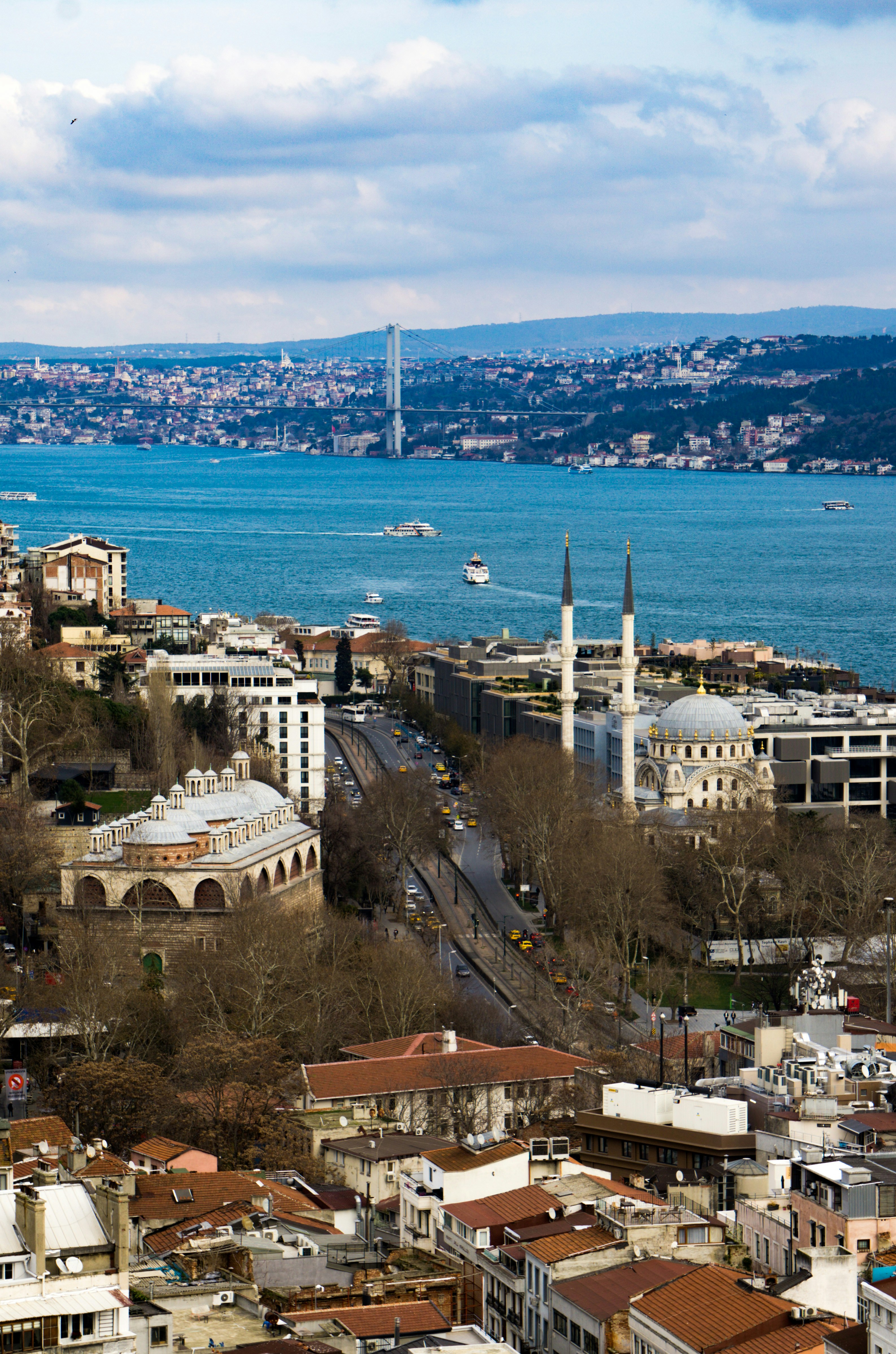 Rising City by the Sea: A Mosque and Minarets Framing the Waterfront