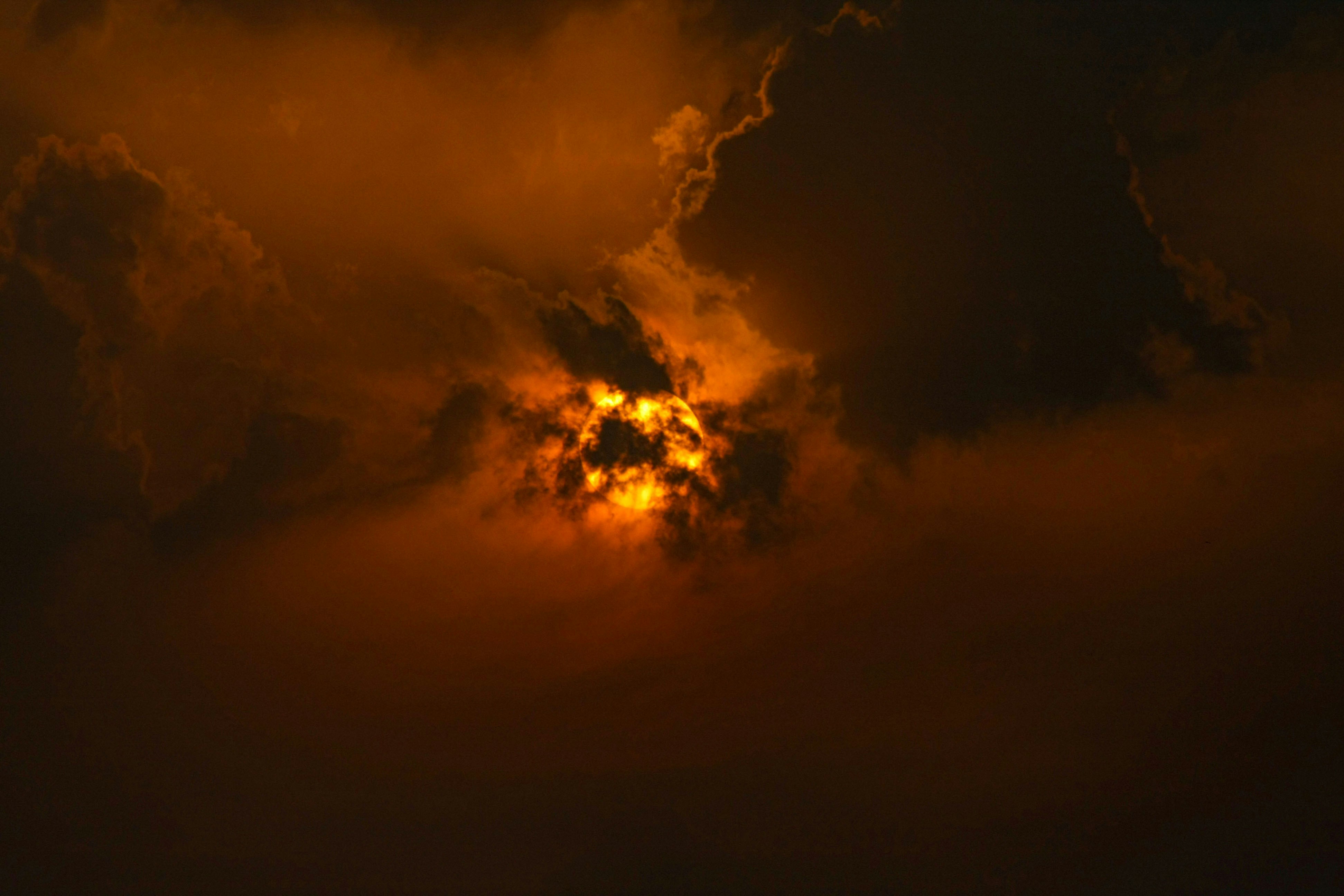 Fiery Quiet: A Subtle Sun Hidden Behind Velvet Clouds