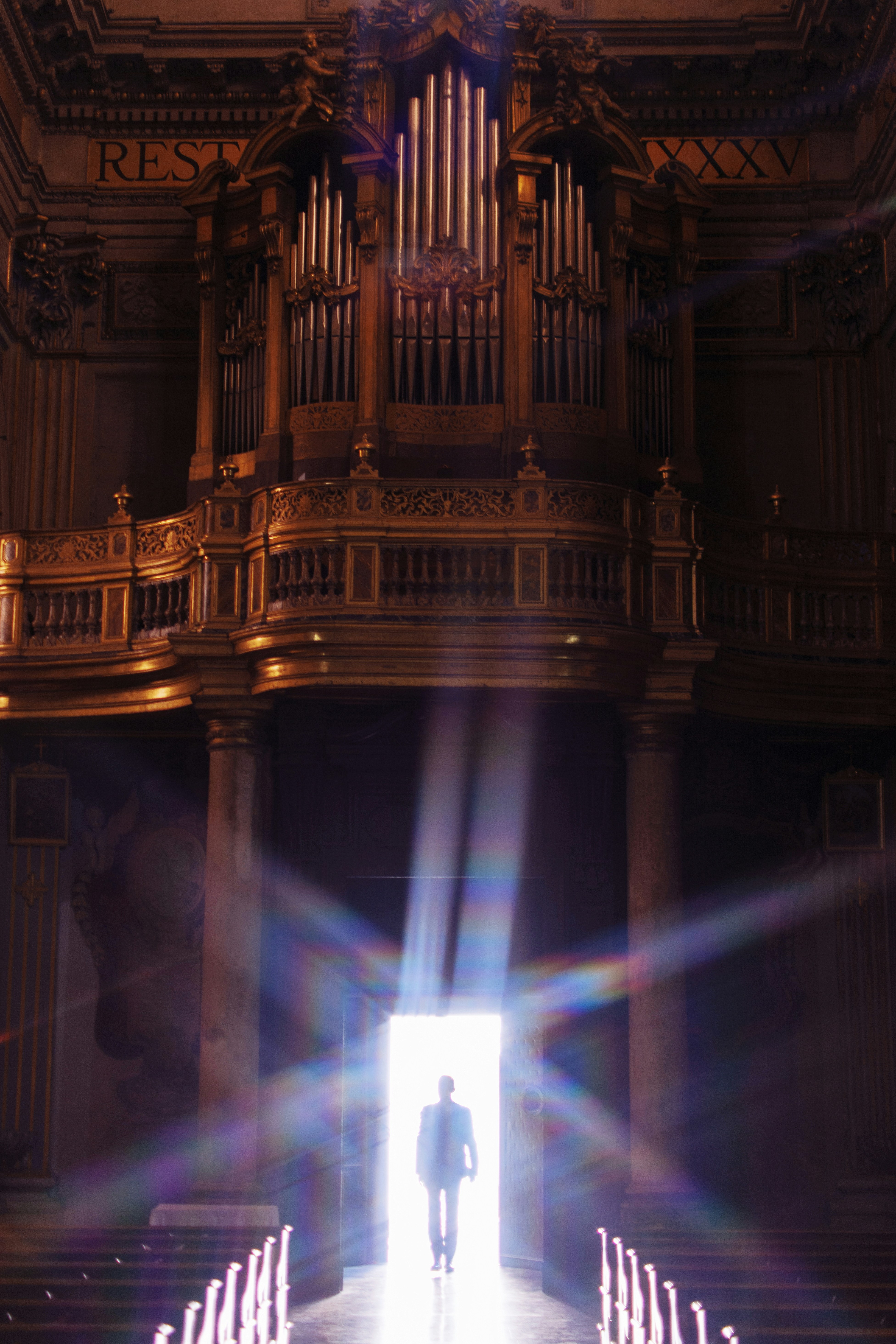 Halo at the Portal: A Silhouette Steps into the Light Through Sacred Organ Tiers