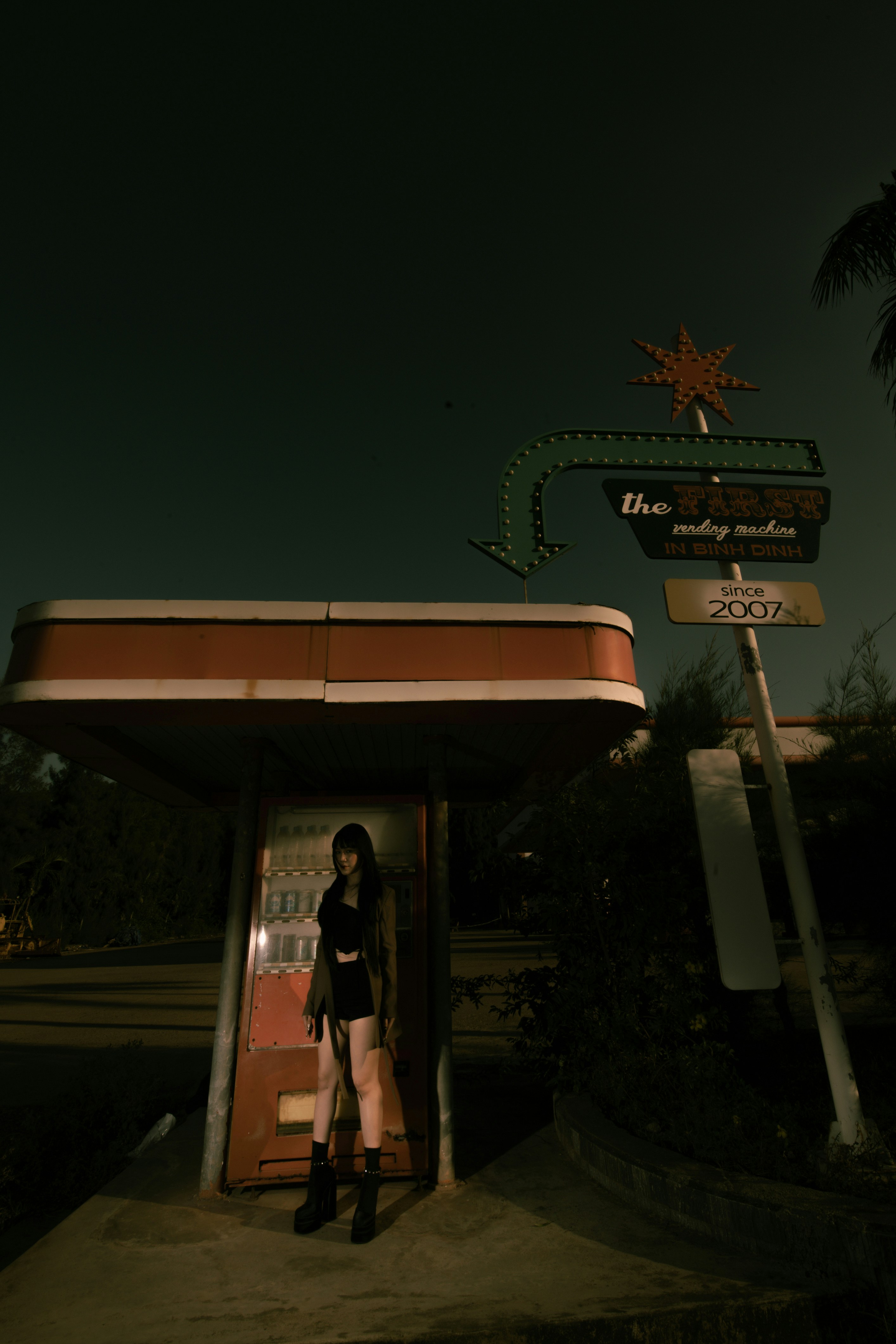 Midnight Neon: A Street-Front Portrait Beneath Diner Lights