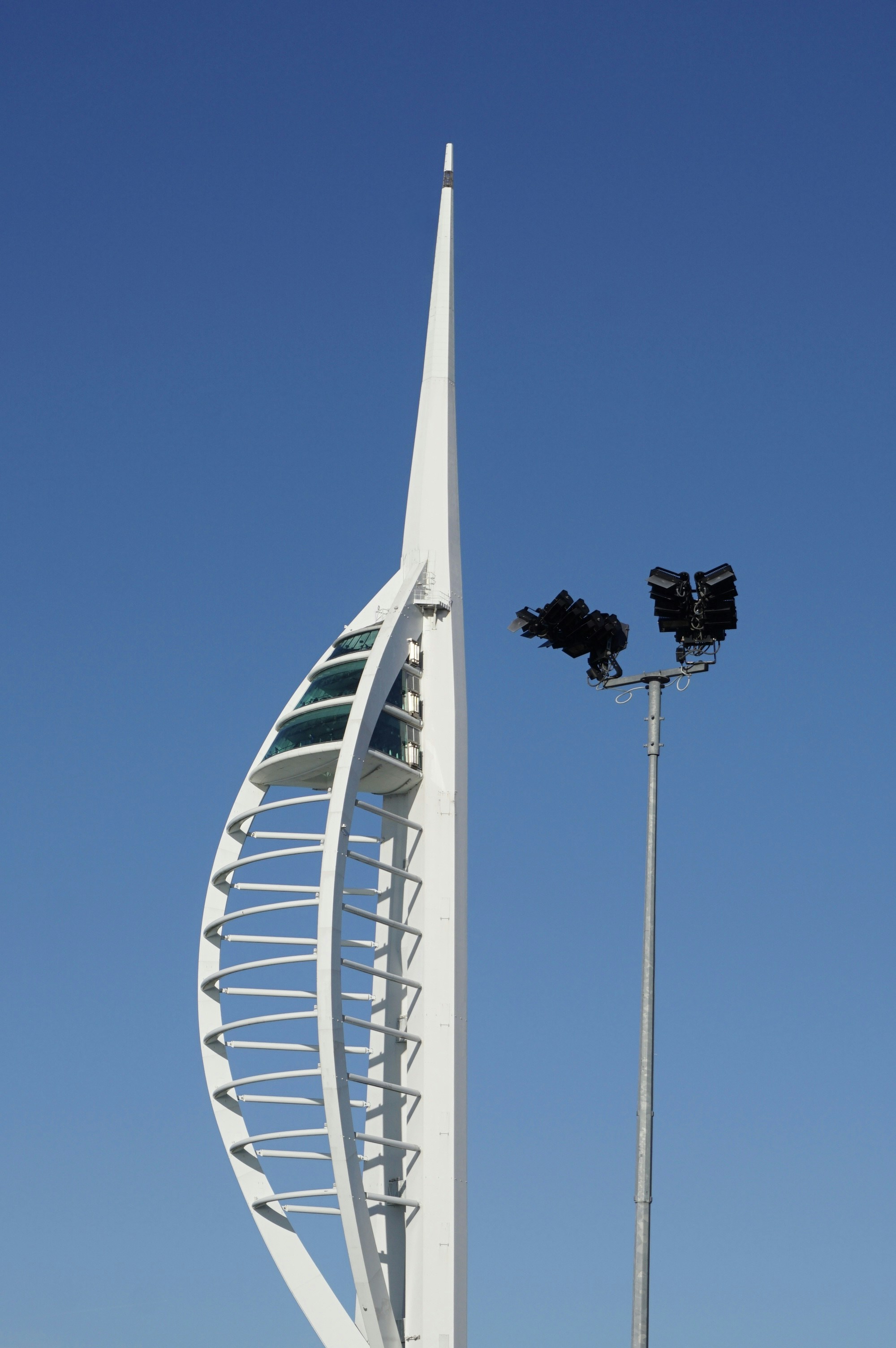 Sail Horizon: The Spire Piercing the Clear Sky
