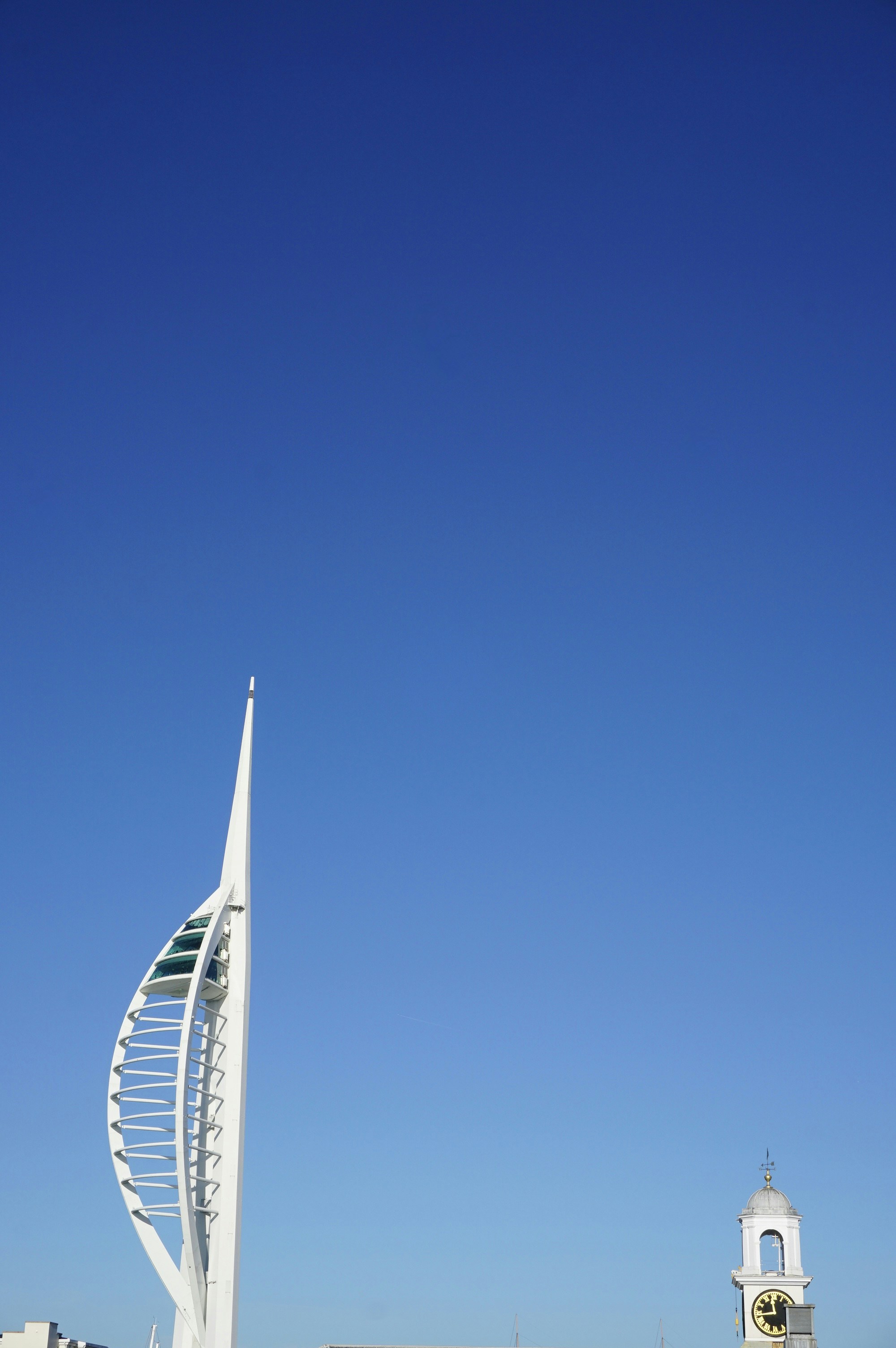 Sail of Steel Against a Cerulean Sky