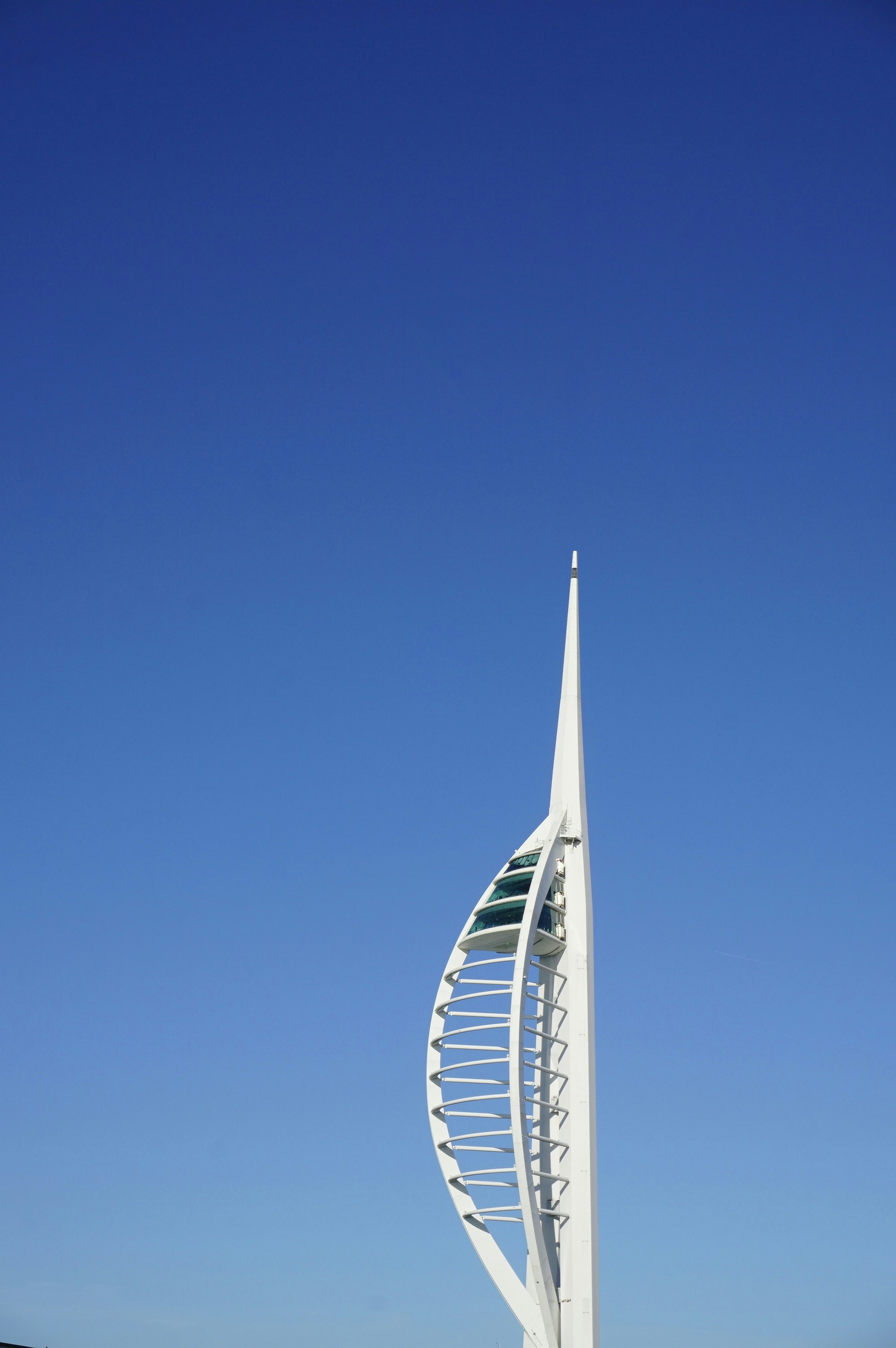 Spire Against the Sky: A Sail-like Tower Reaching for Light
