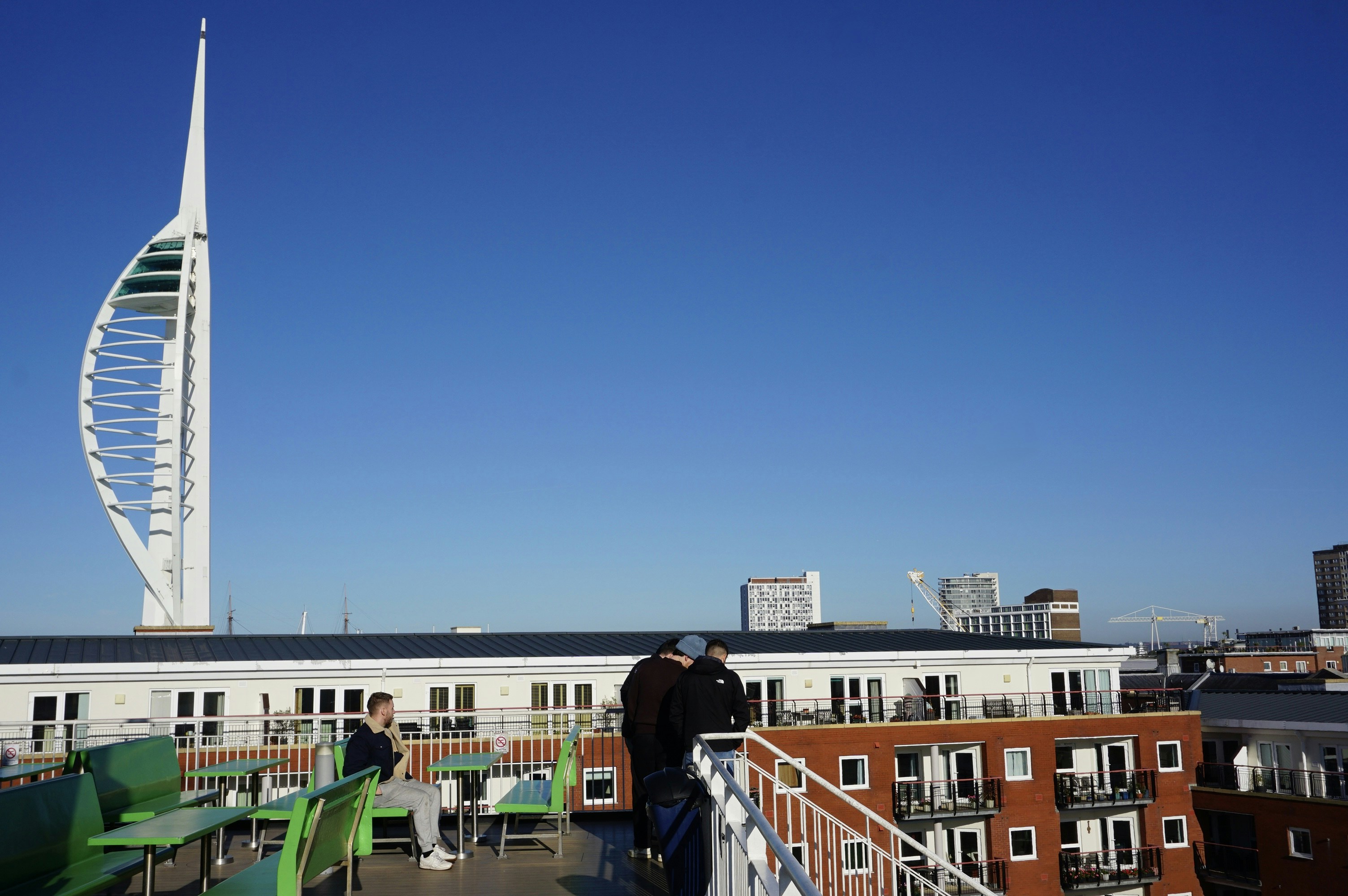 Rooftop Assembly Under a Clear Valencia Sky