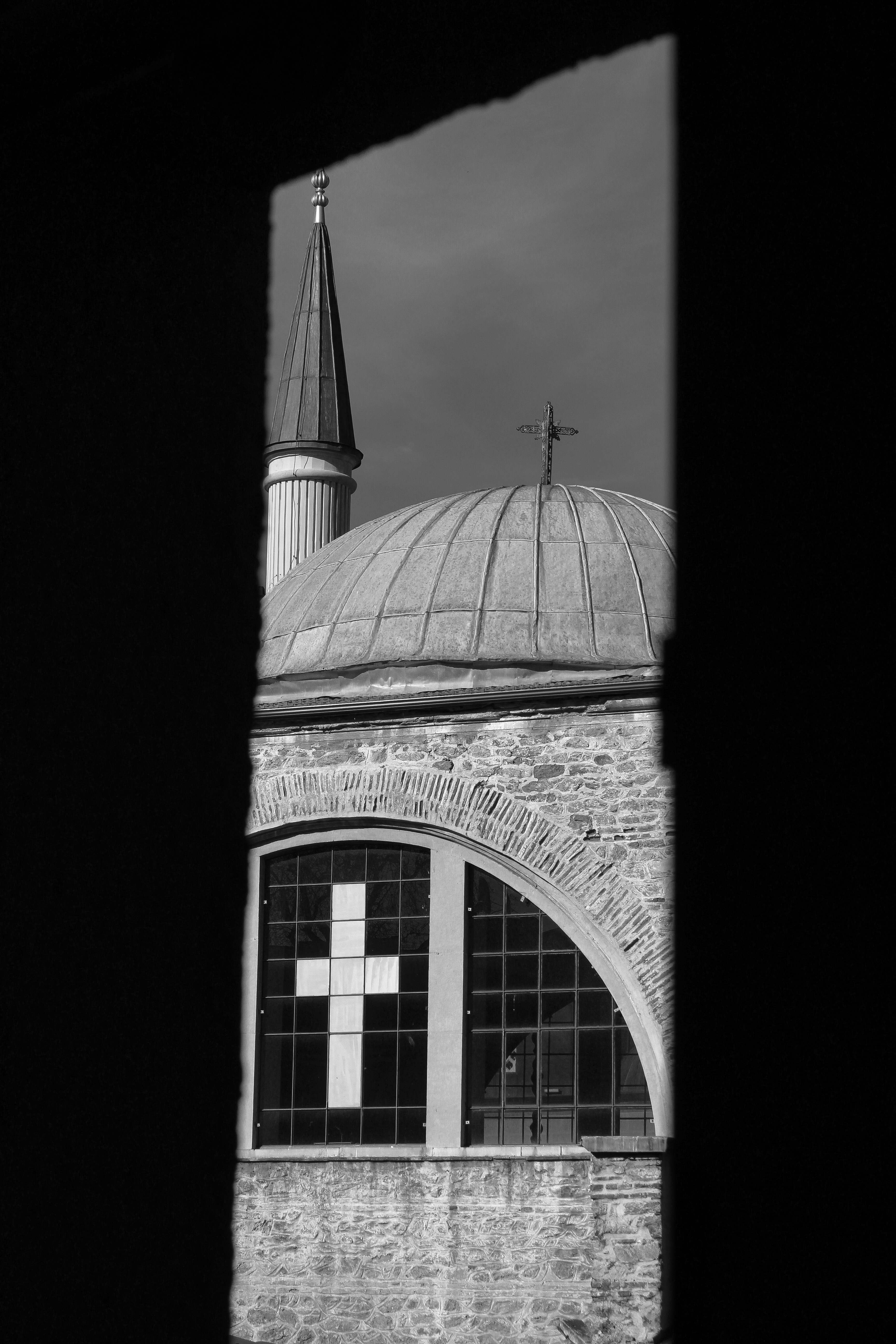 Hidden Sanctuary Through a Narrow Slit: Dome, Window, and Spire