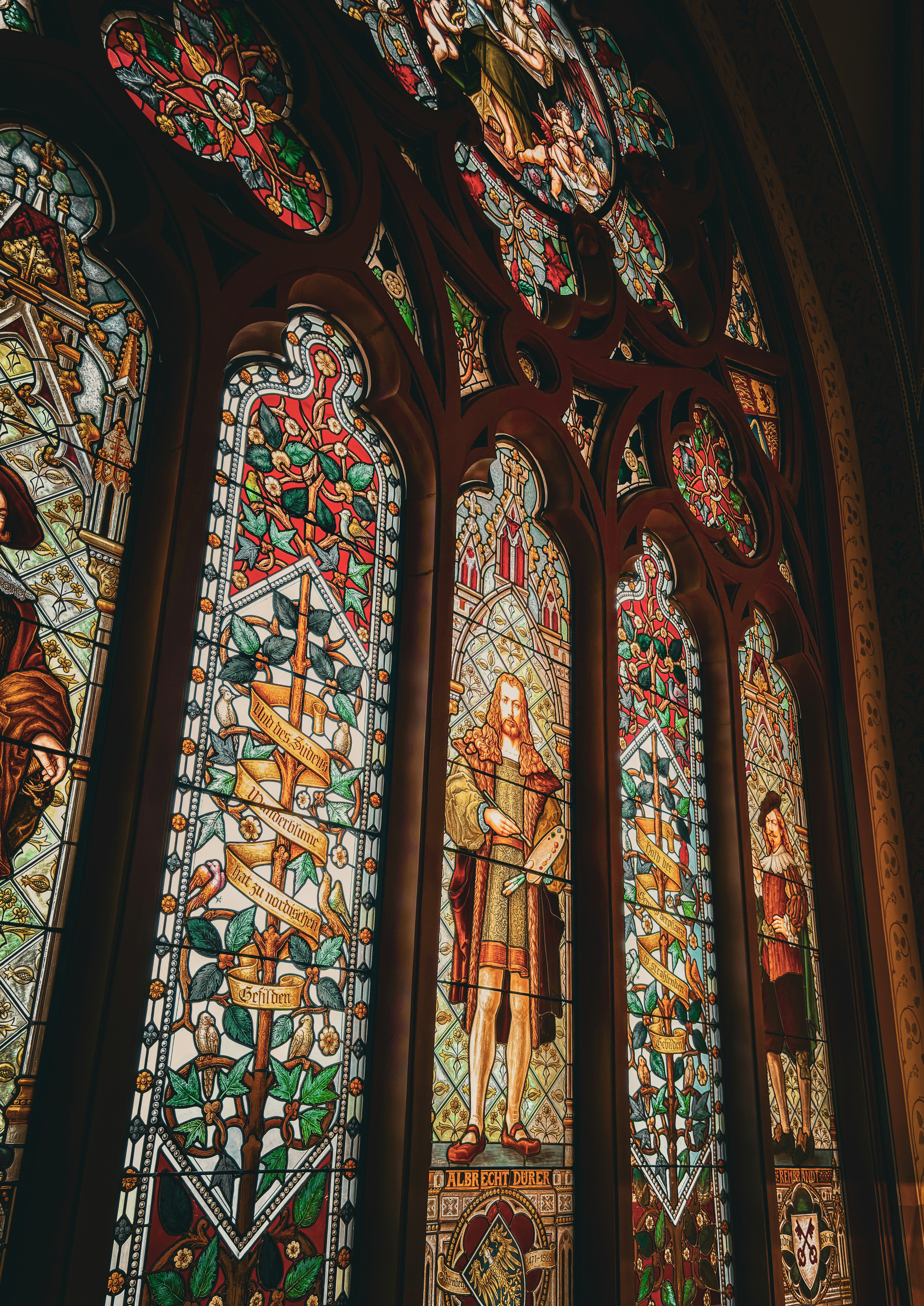 Stained Glass Corridor: Portraits of Faith in Colored Light