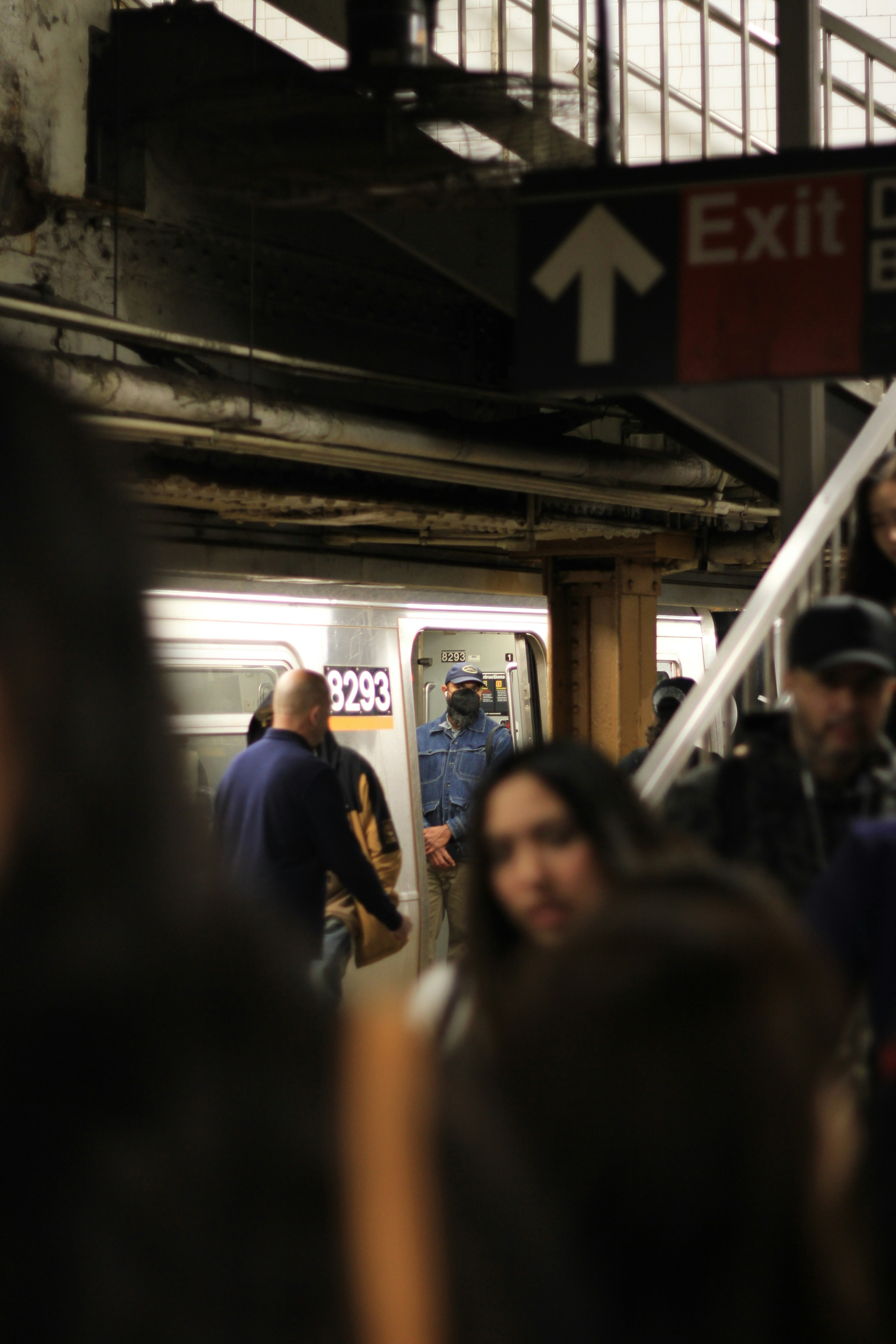 Midday Rush at the Station: Faces in the Crowd