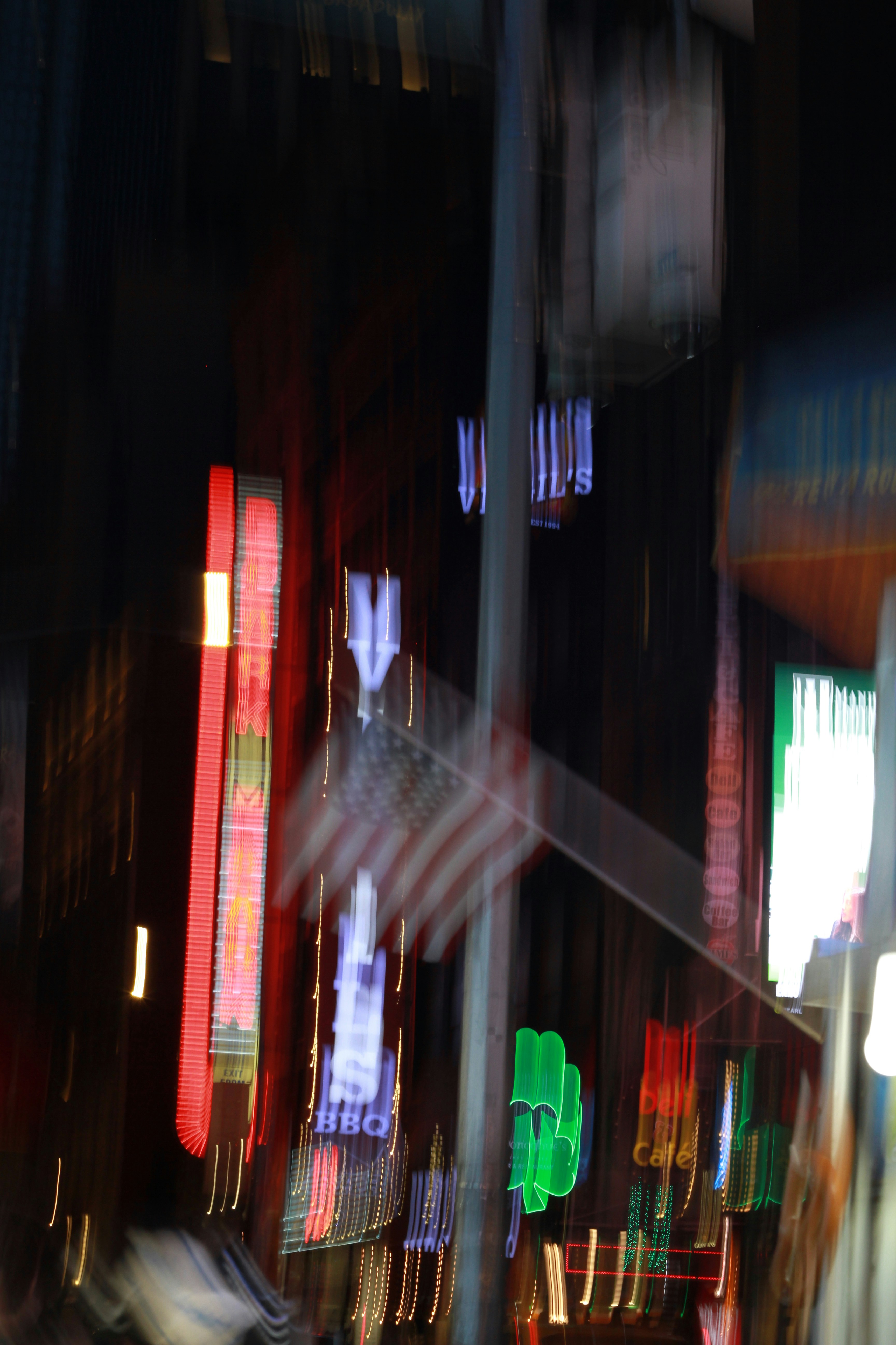 Neon Night Blur: A City Strip of Moving Lights