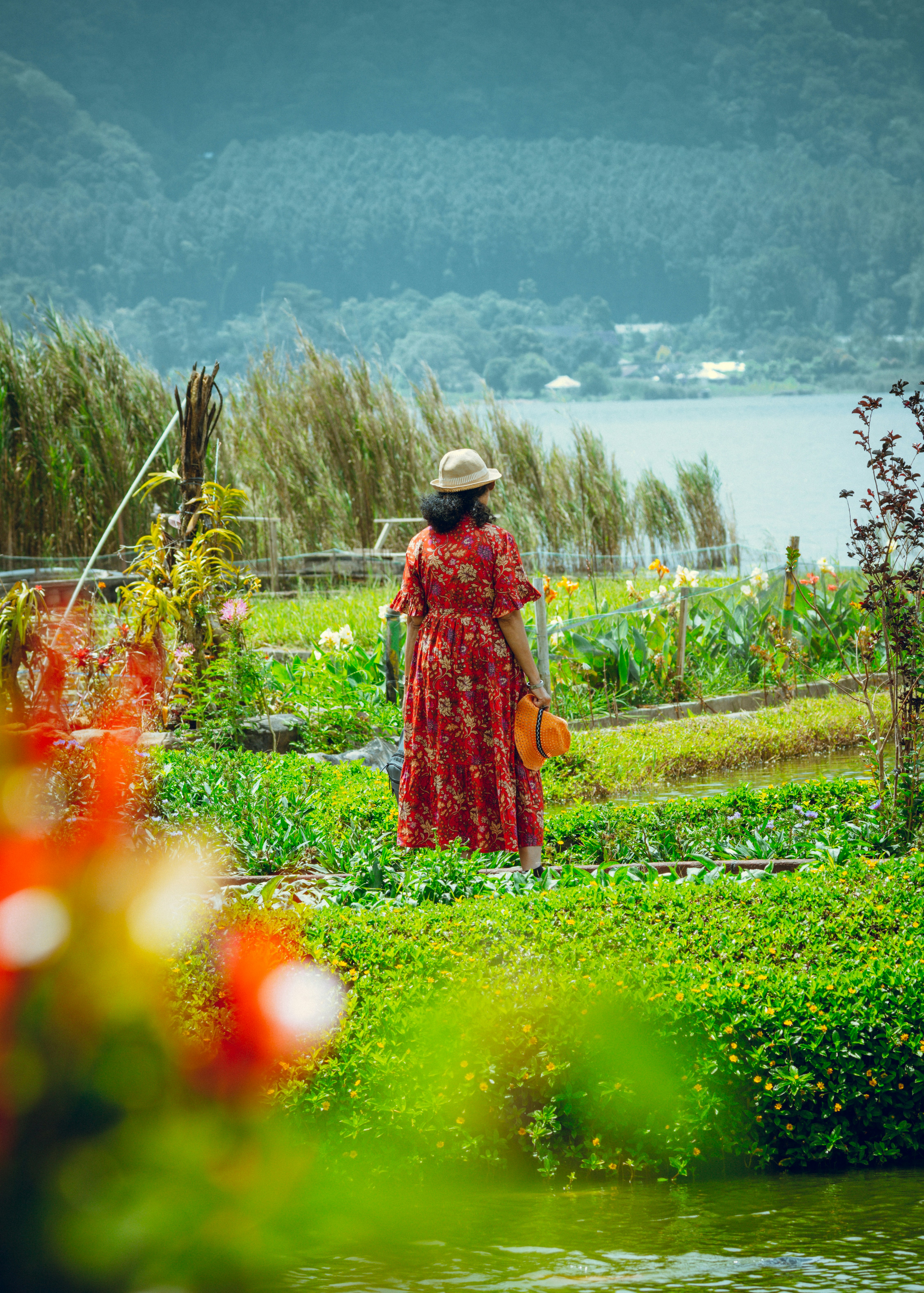 Red Floral Dress by the Water’s Edge