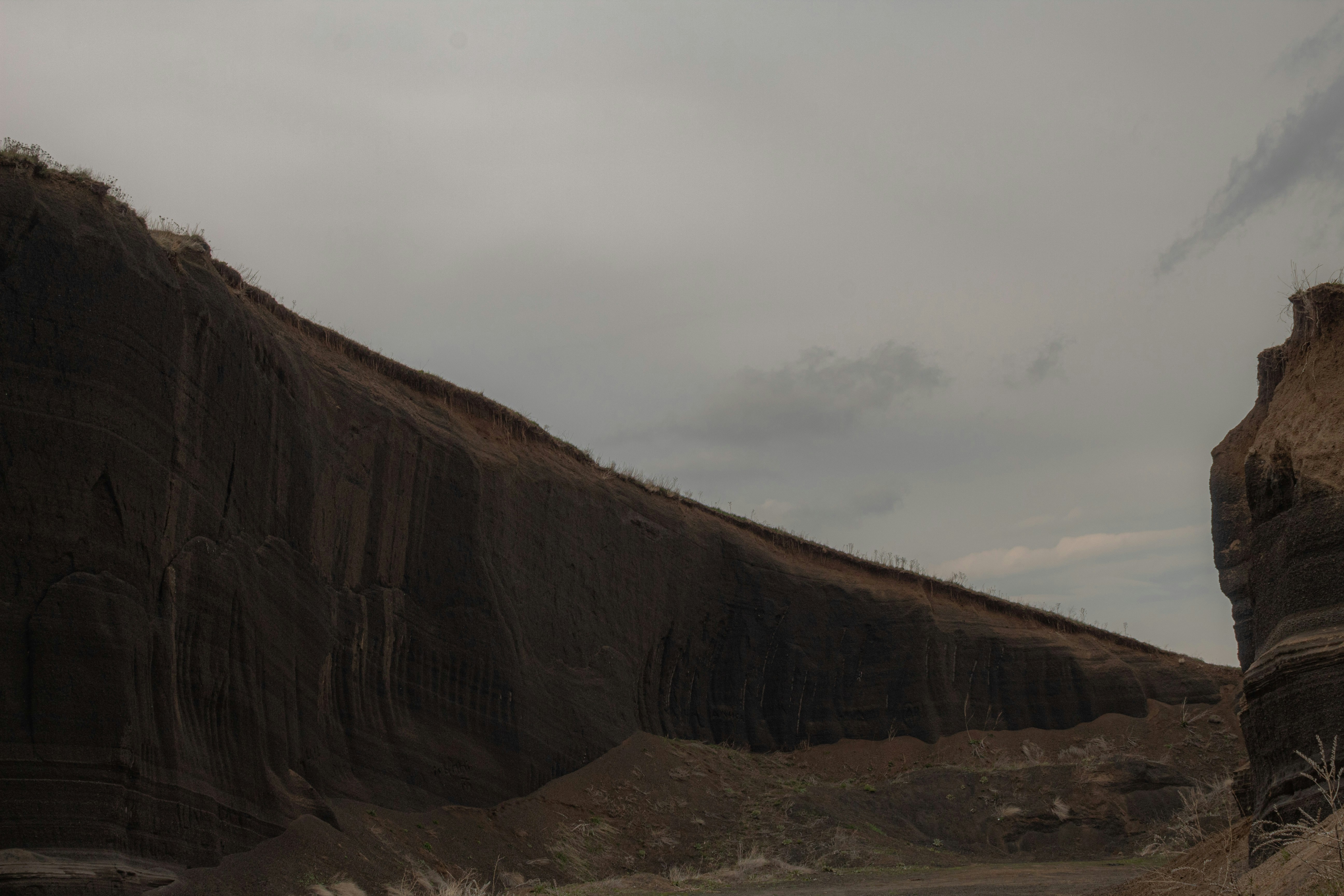 Desolate Canyon Edges Under Muted Skies