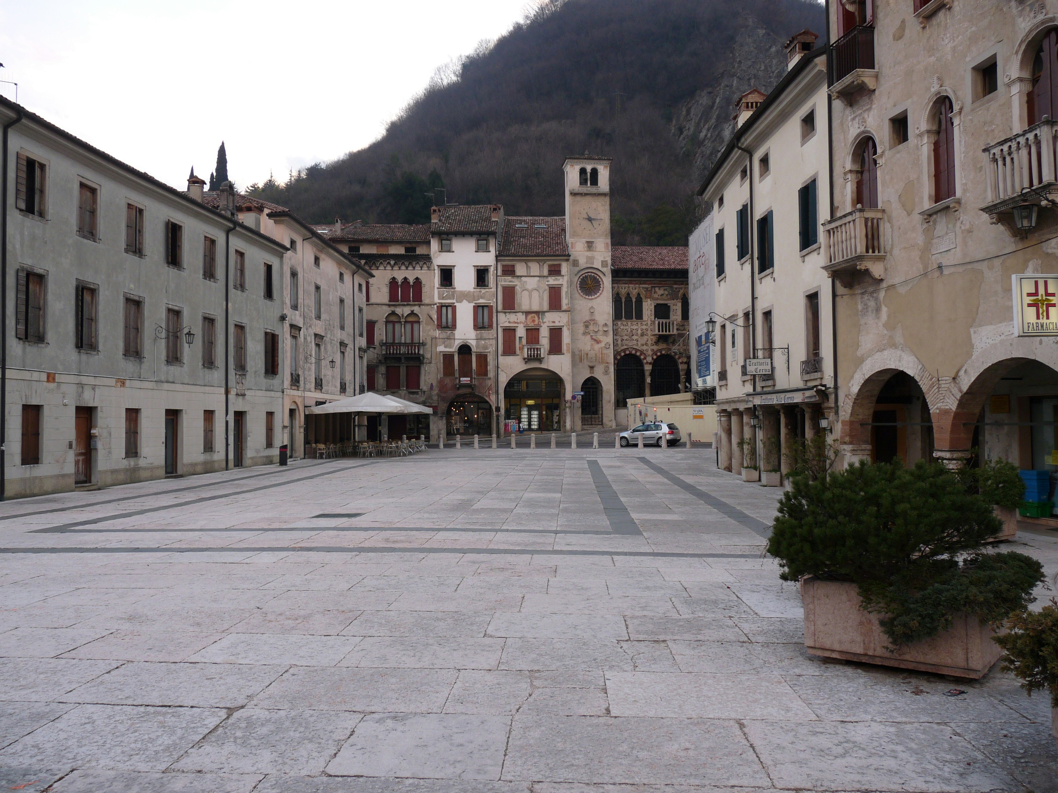 Central Piazza Gateways: A Quiet Town Square Leading to Archways