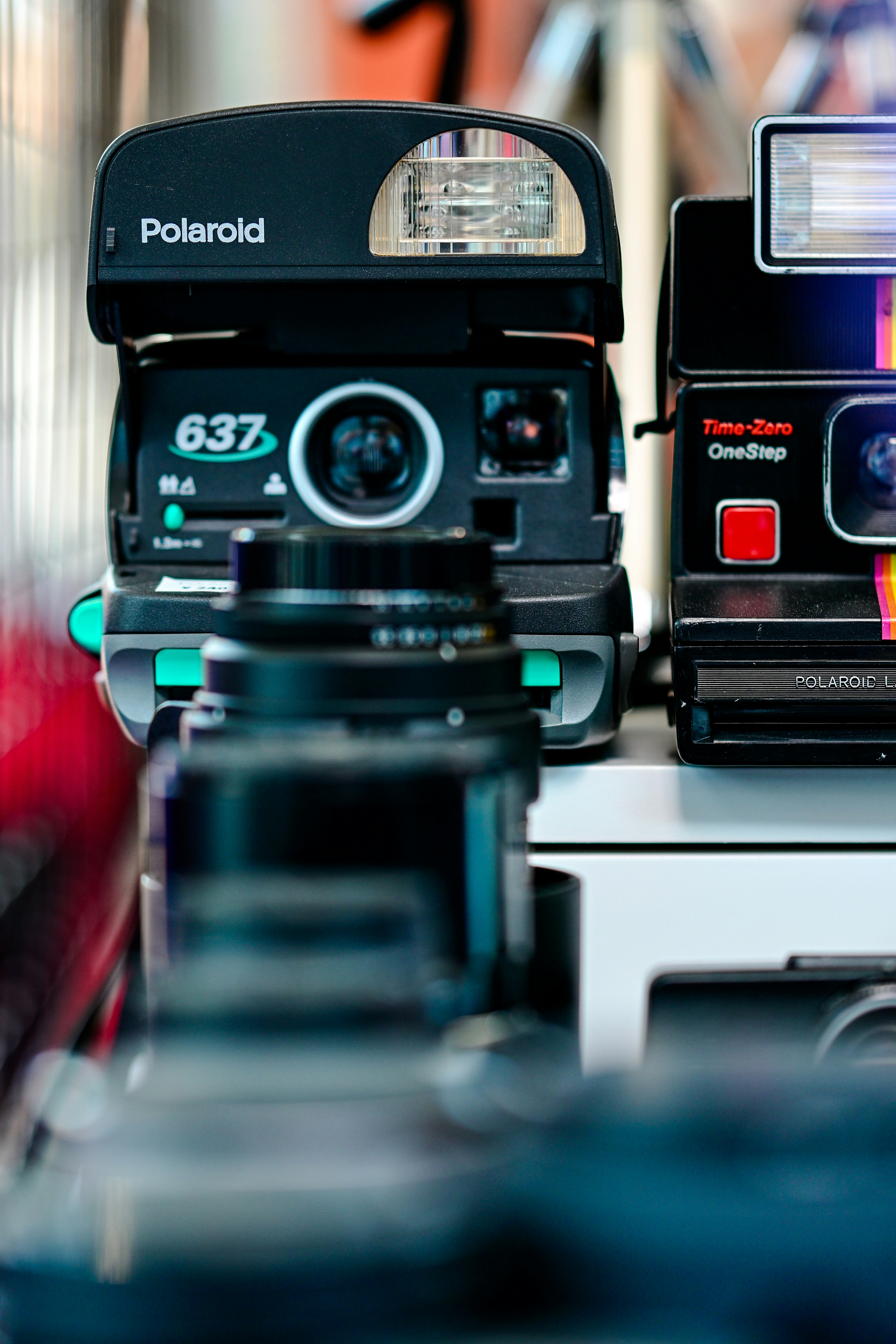 Polaroid Twins: A Row of Retro Instant Cameras in Focus