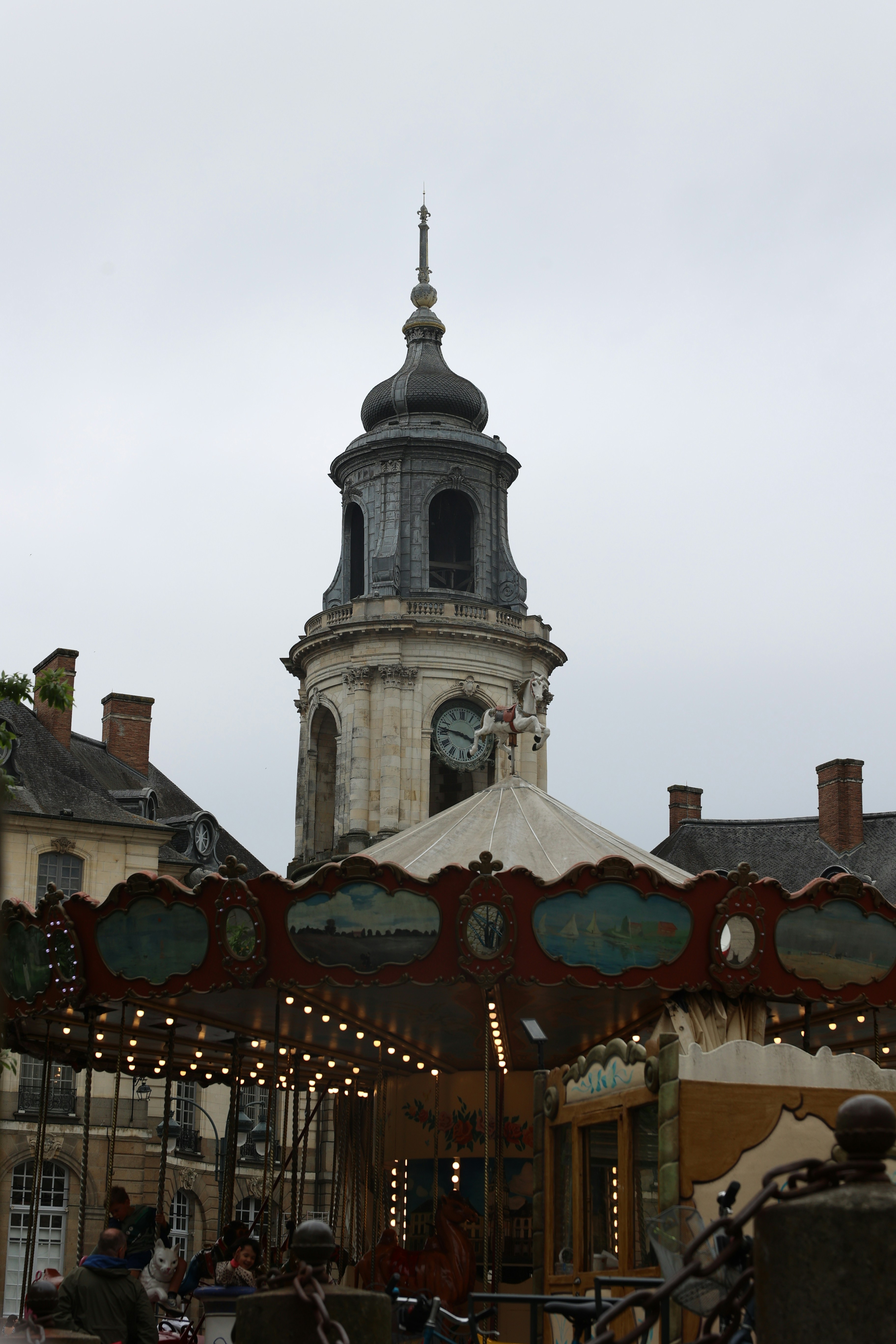 Clock Tower Over the Whimsical Carousel