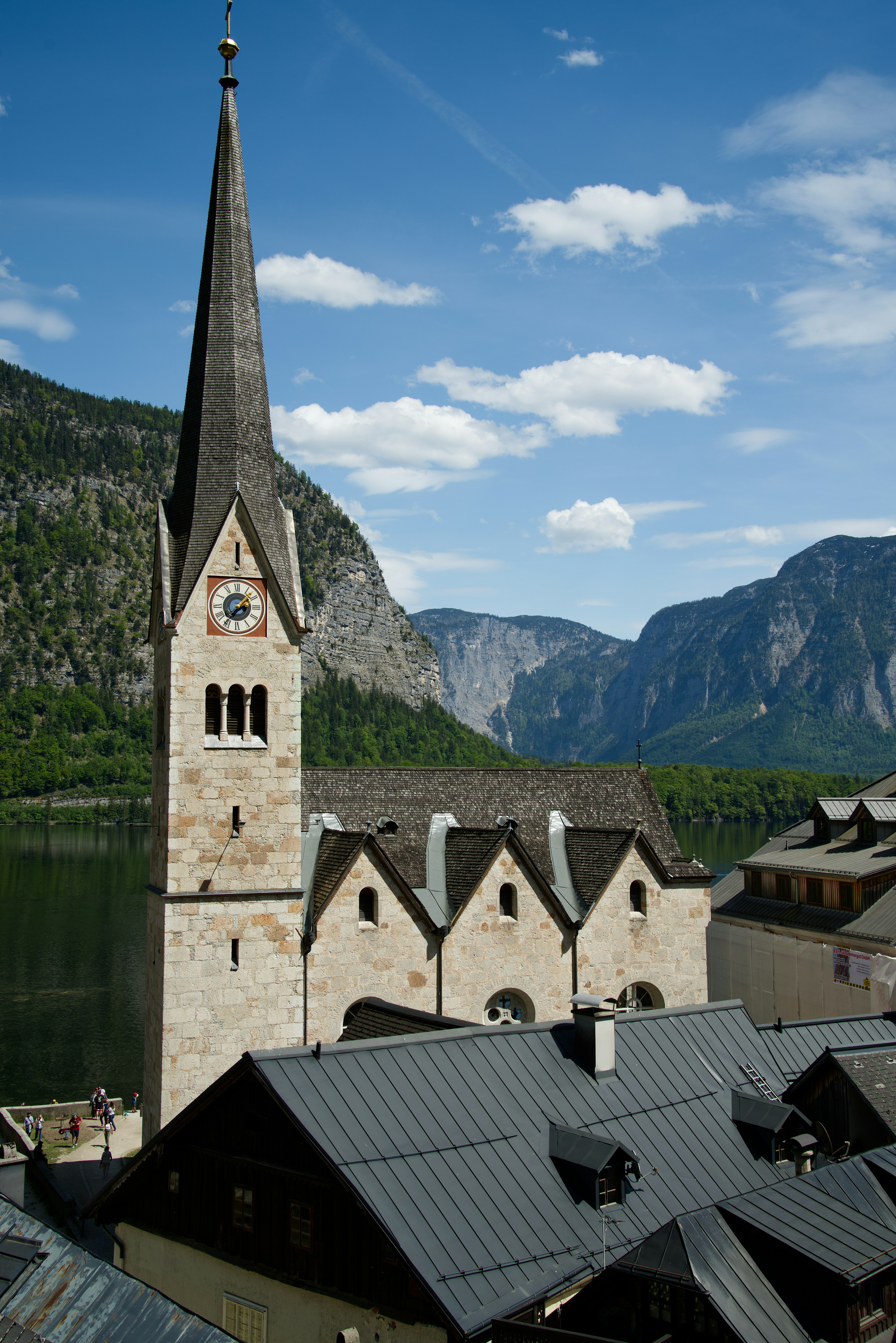 Towering Clocktower Rising Over Quiet Alpine Village